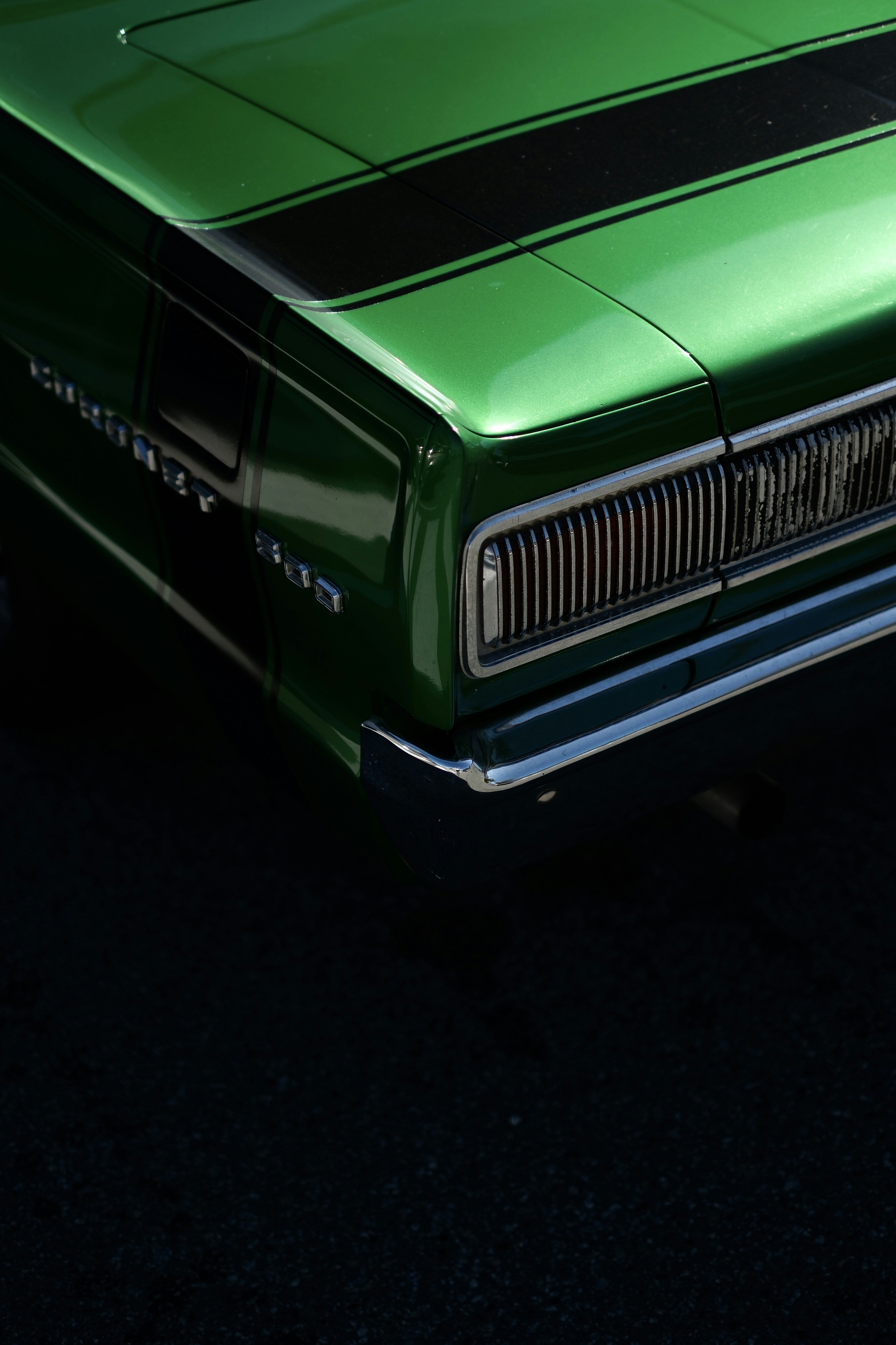 Instagram - @kaprion | Shiny green vintage car with black racing stripes