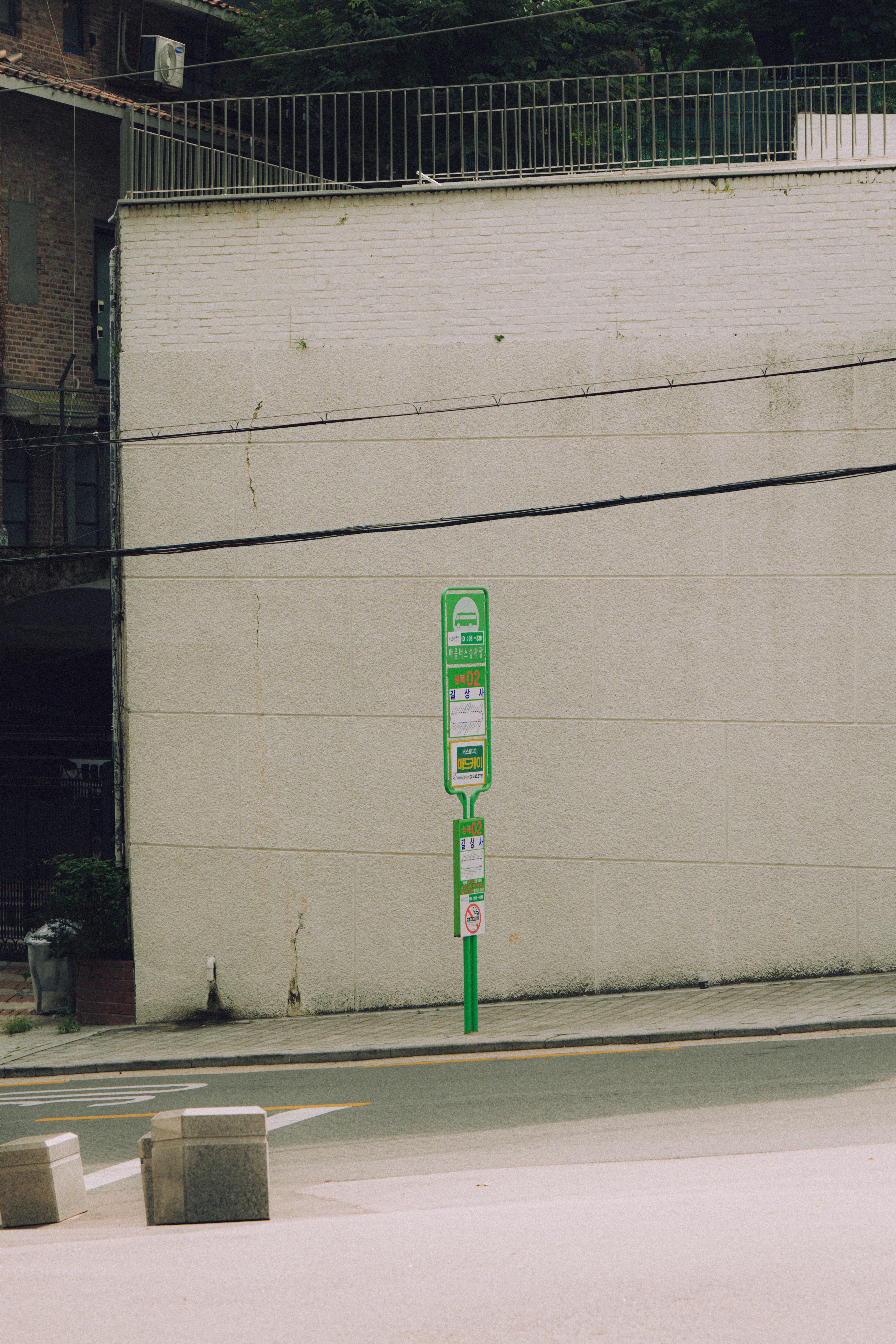 Urban Transit Marker Amidst Concrete Stillness