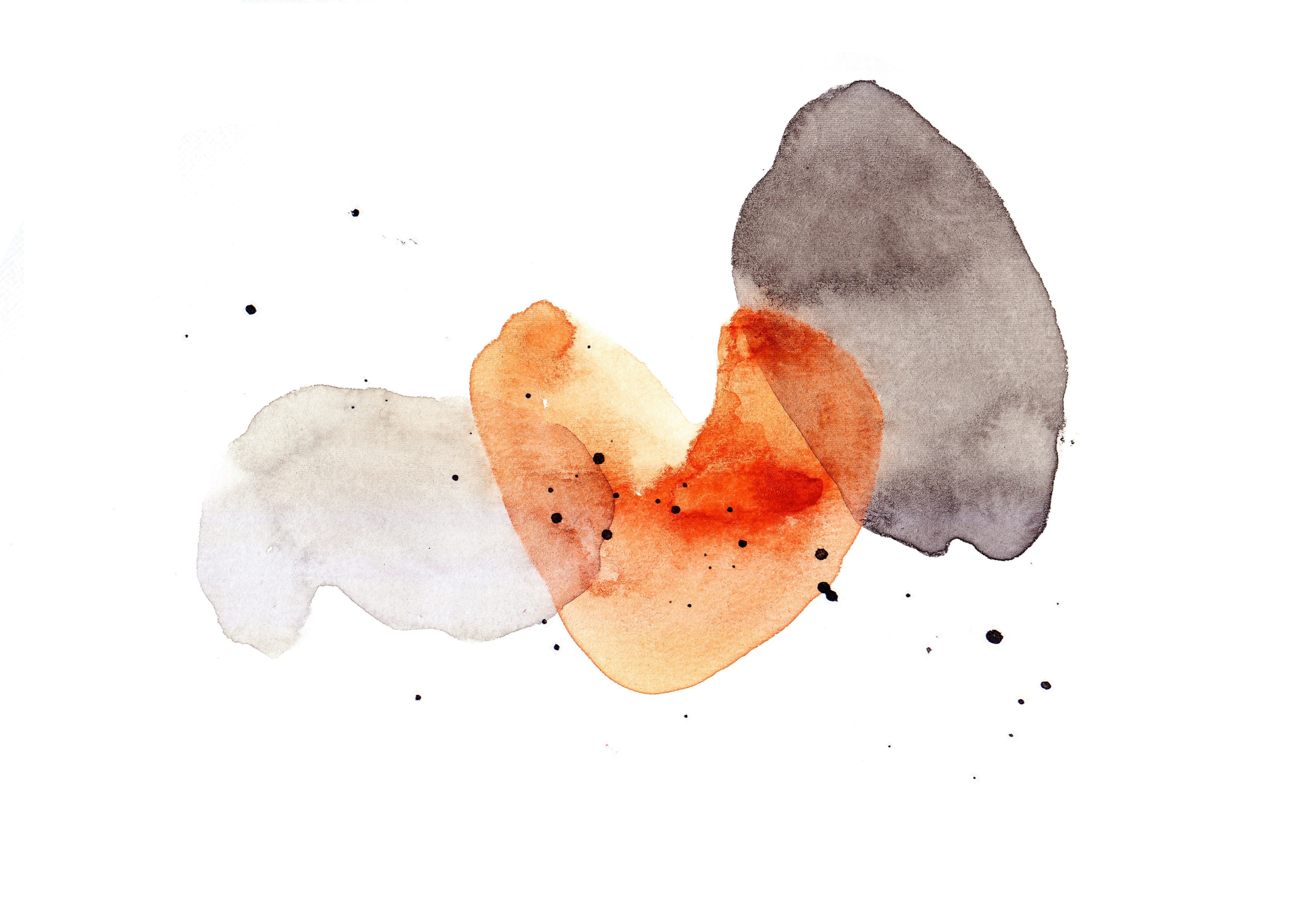Abstract watercolor composition featuring soft, blended hues of orange, gray, and white with subtle splashes of black.