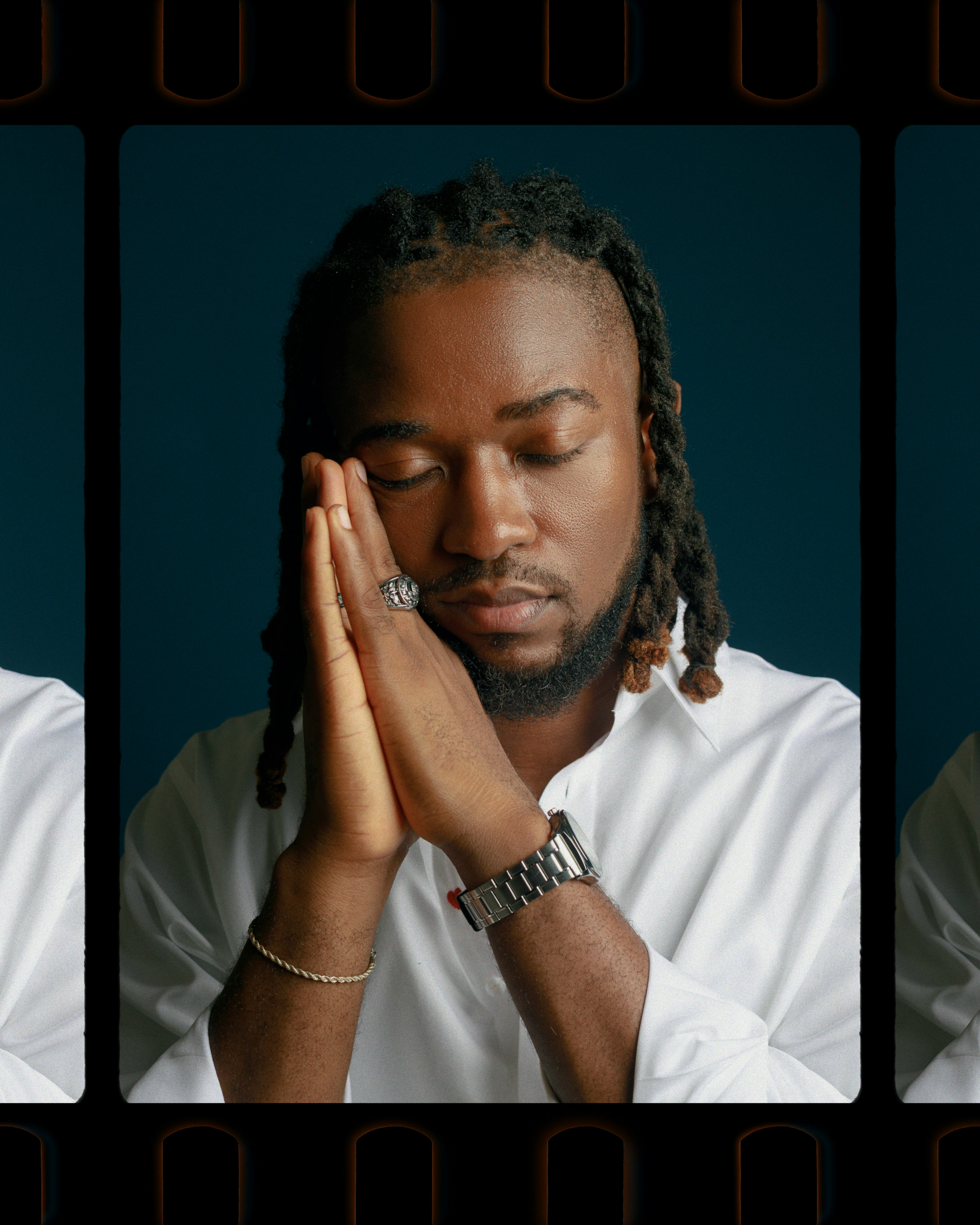 Man with eyes closed resting head on hands