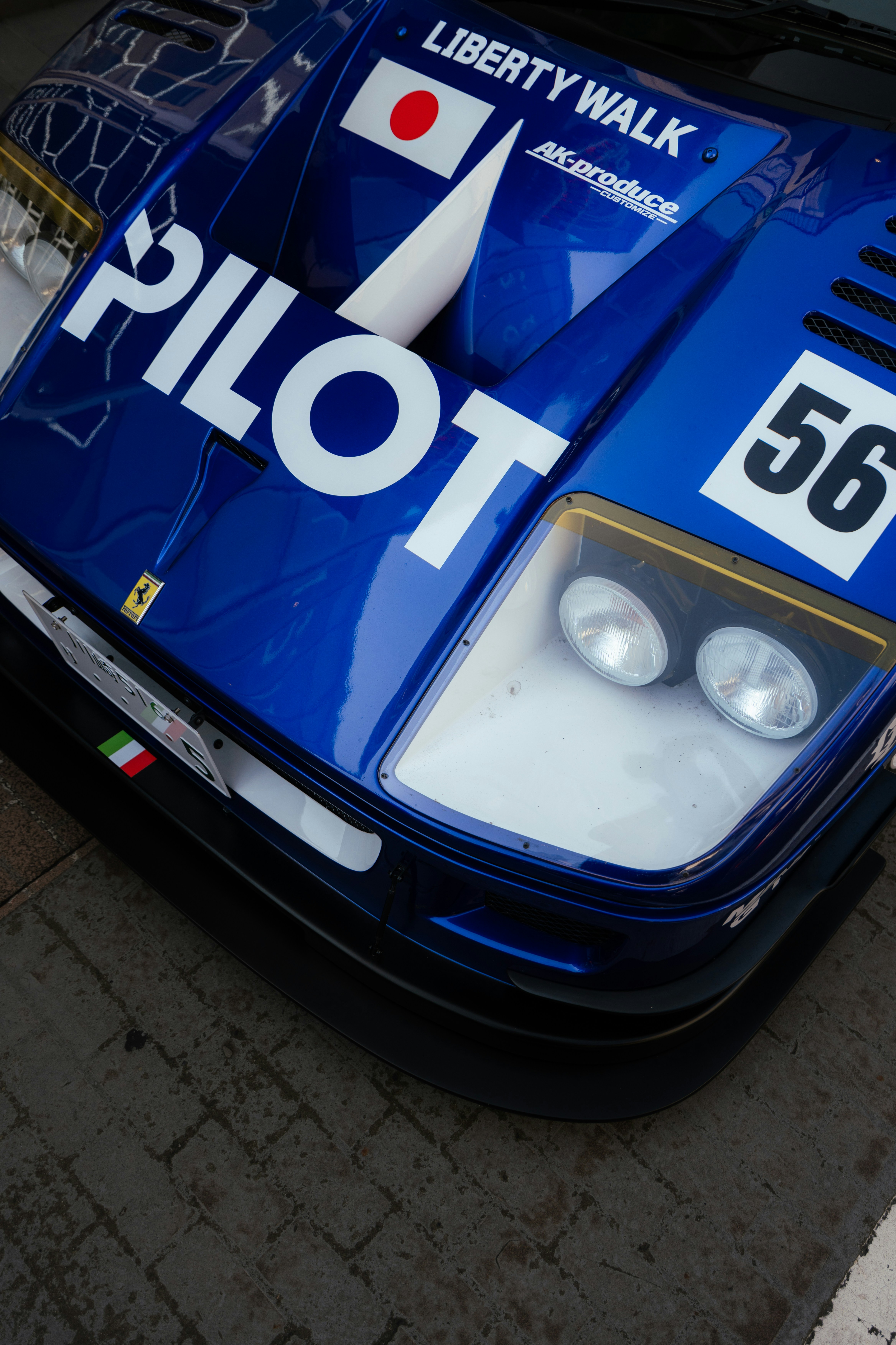 Blue race car with "pilot" and "56" markings. photo – Free Sports car ...
