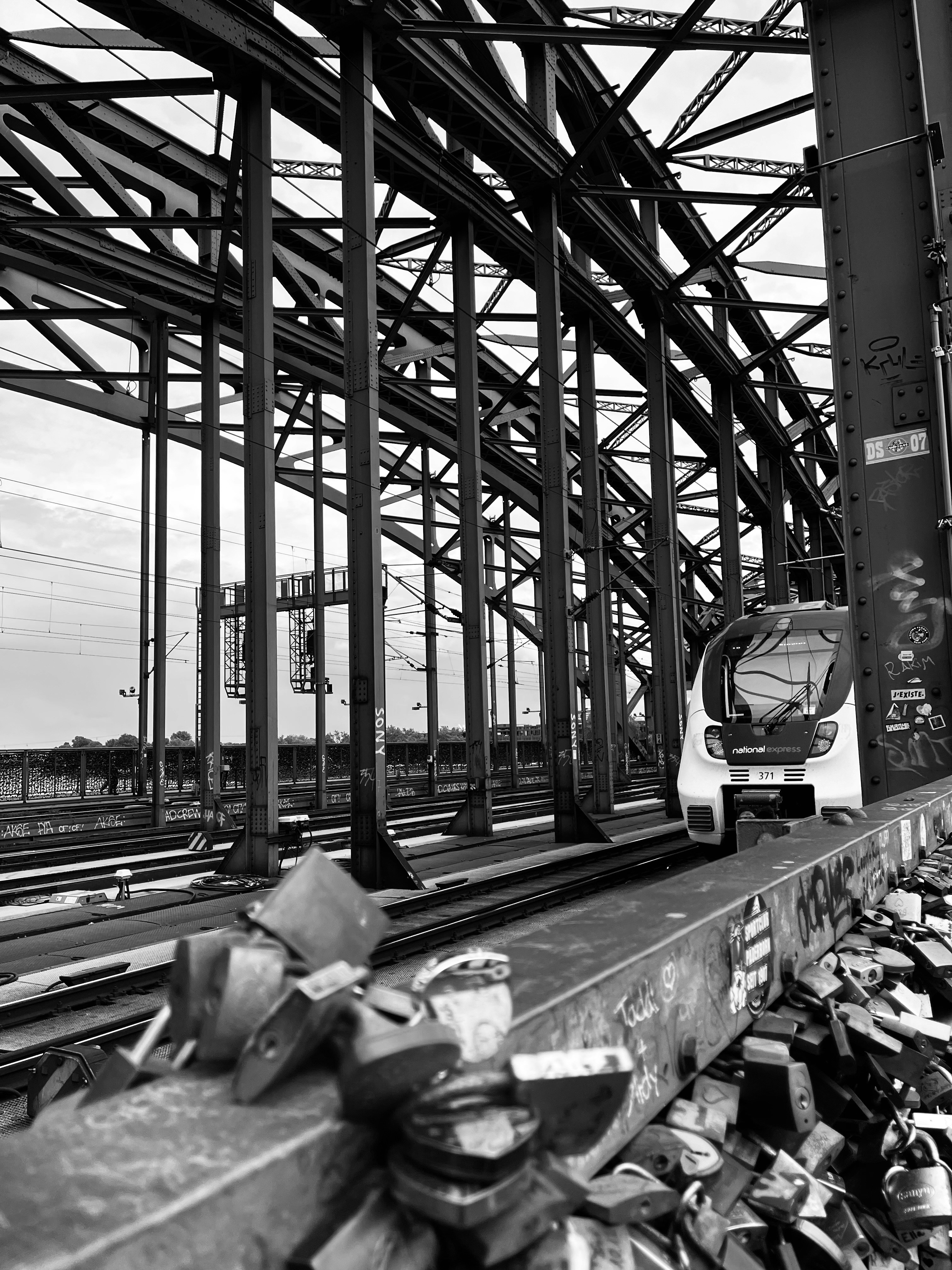 Last train | Modern train on a steel bridge with locks
