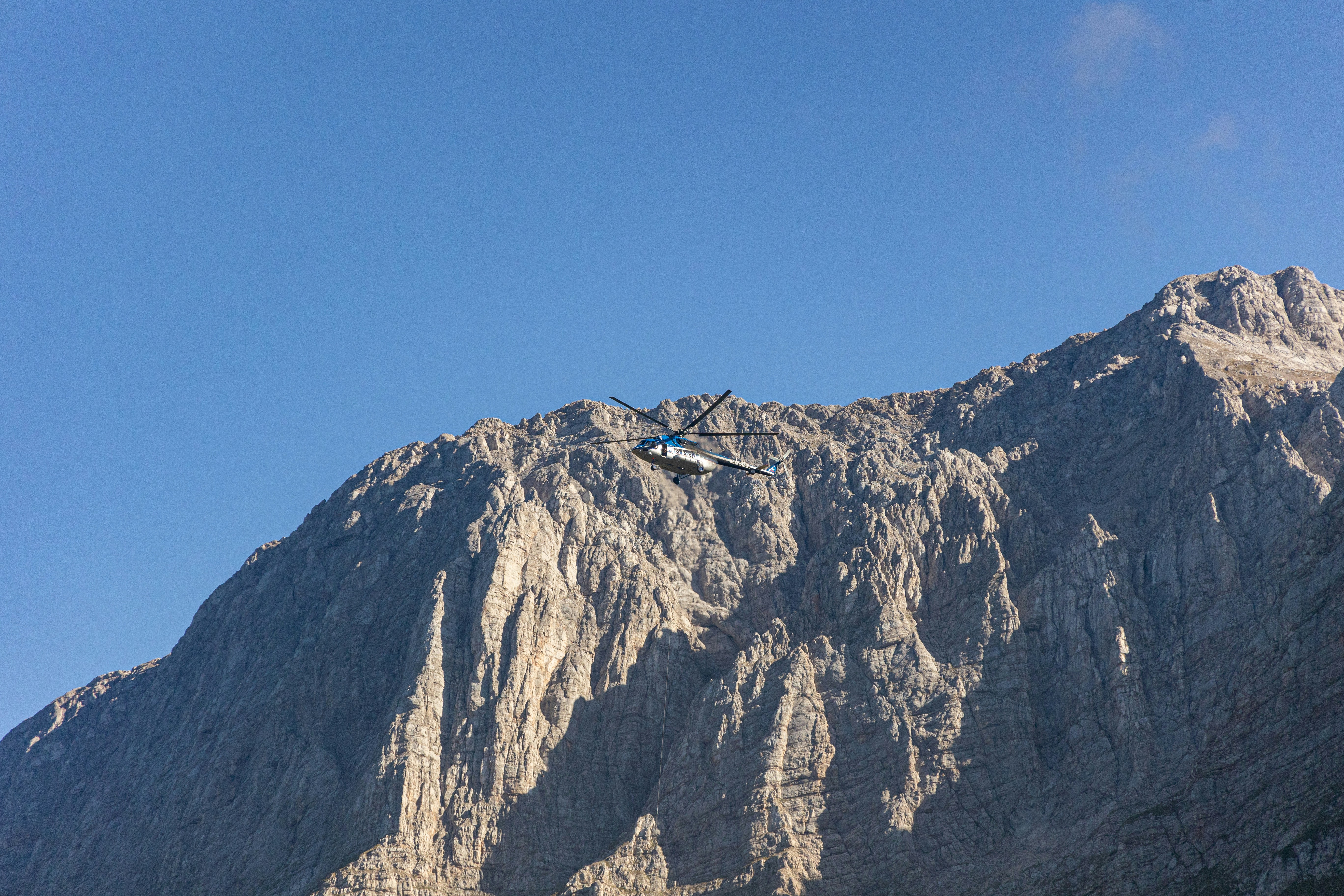 Soaring Above the Crags: A Helicopter's Journey