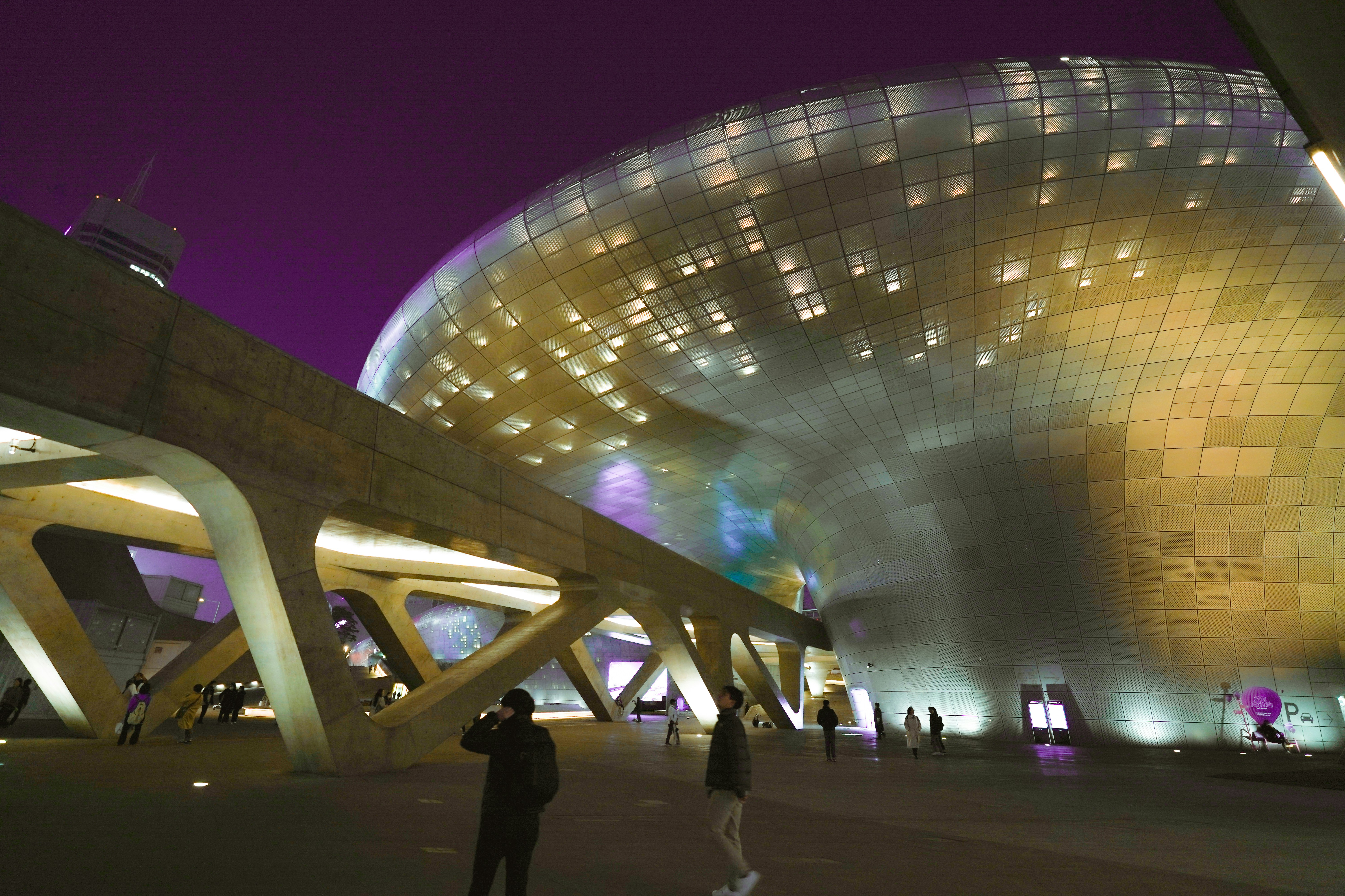 Modern building with illuminated facade at night
