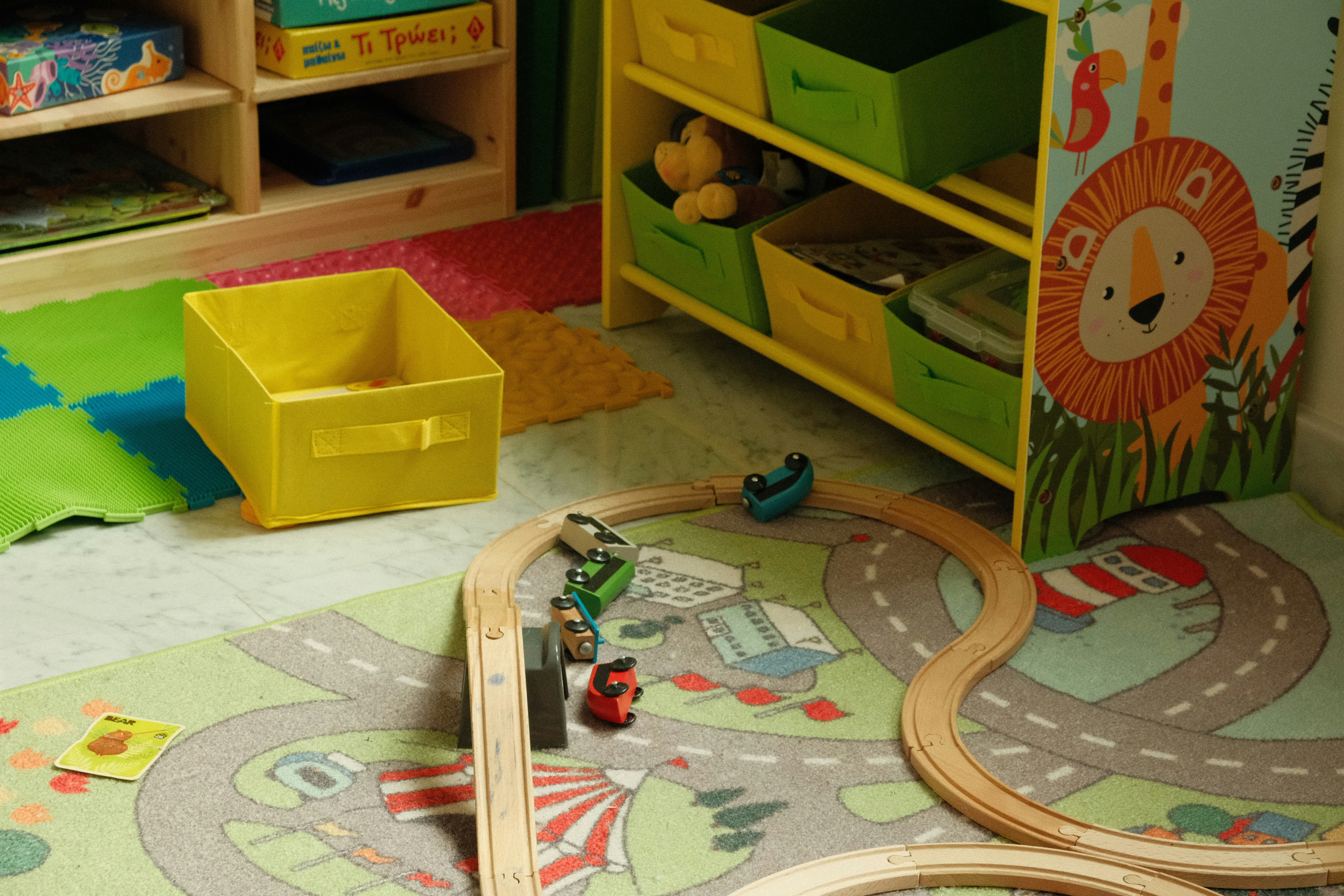 Children's playroom with toy train and storage