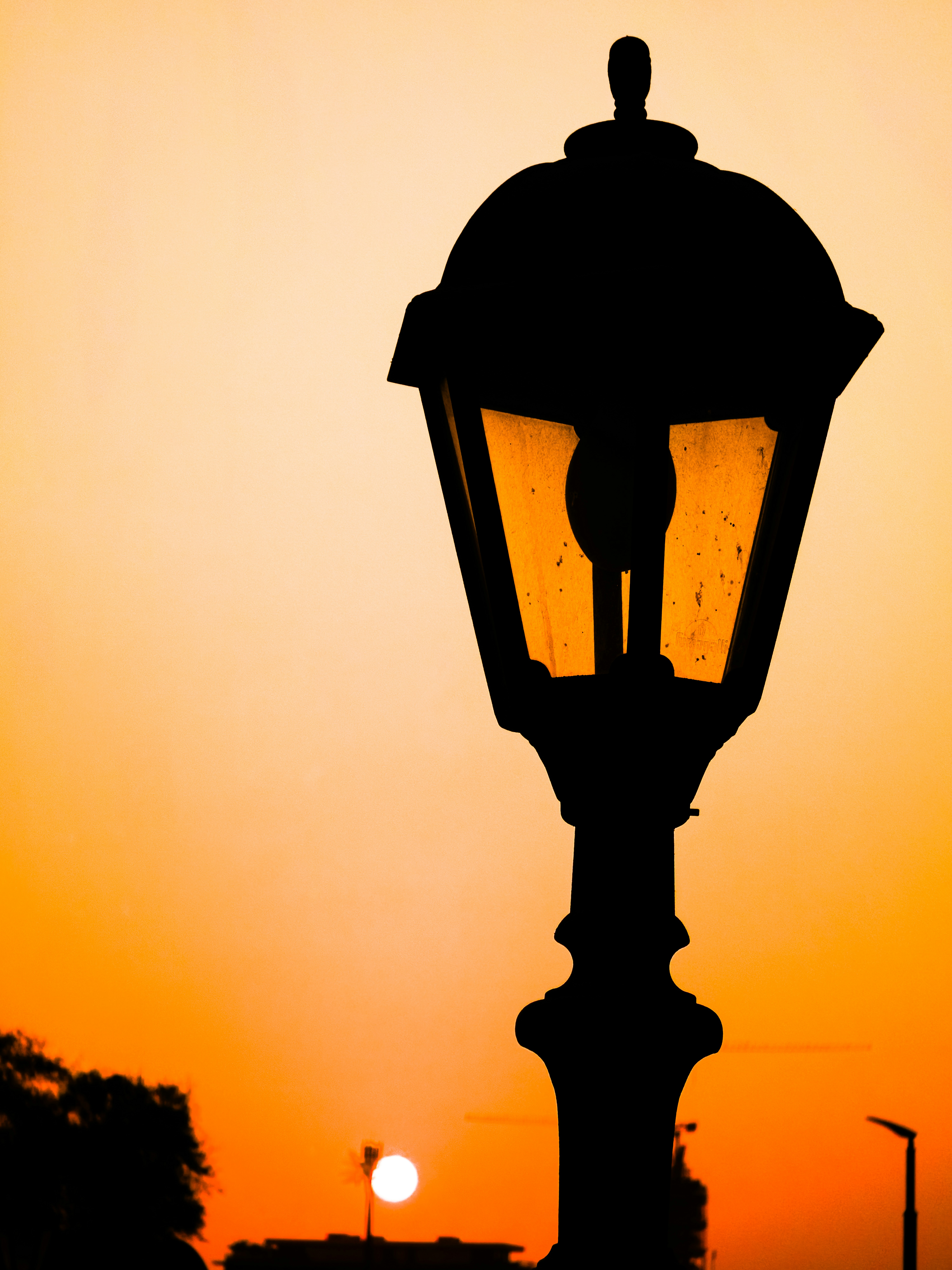 Illuminated Silhouette Against a Fiery Sky