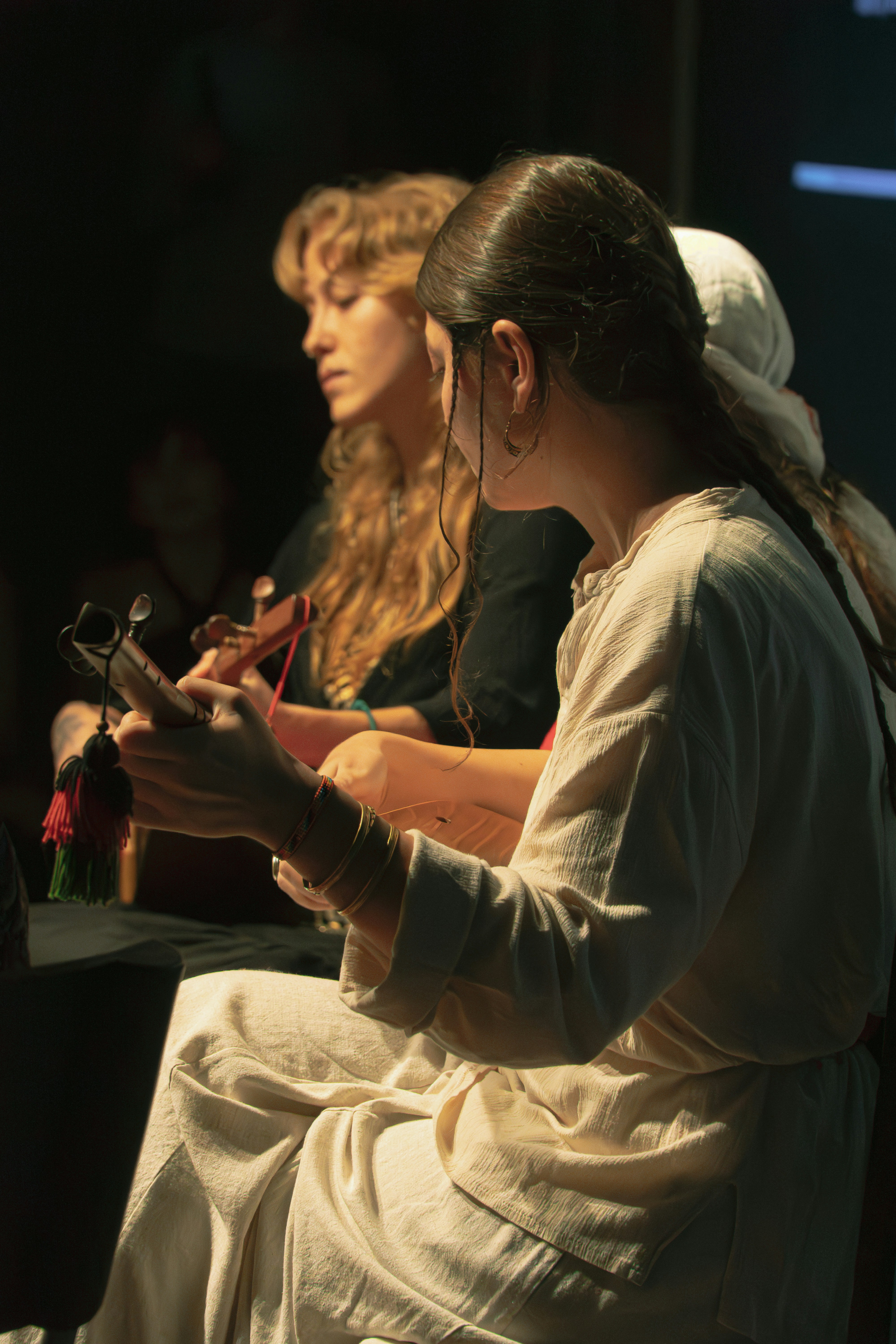 Quiet Focus: Hands and Strings in the Backlit Stage