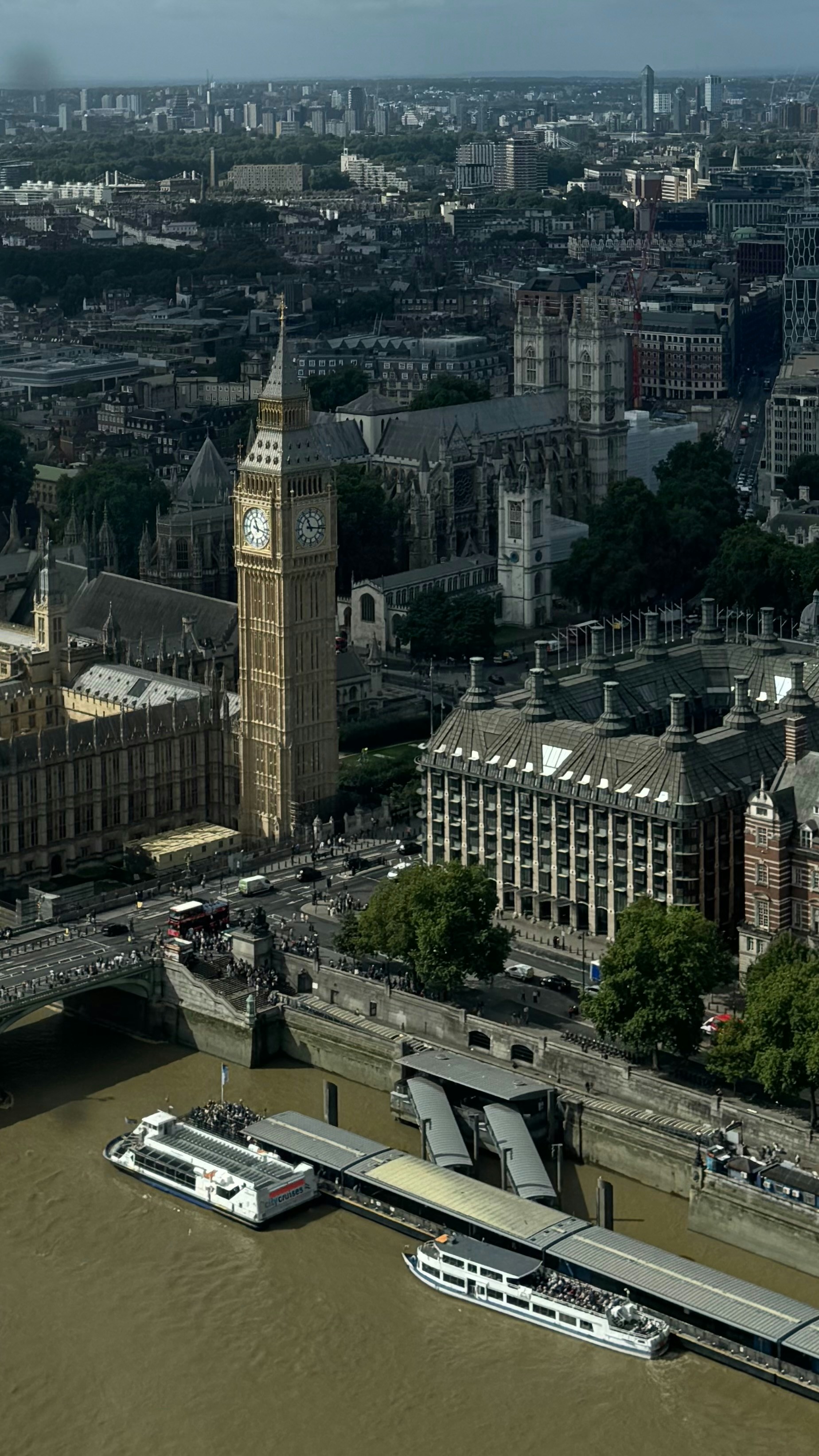 Big ben and houses of parliament over river thames