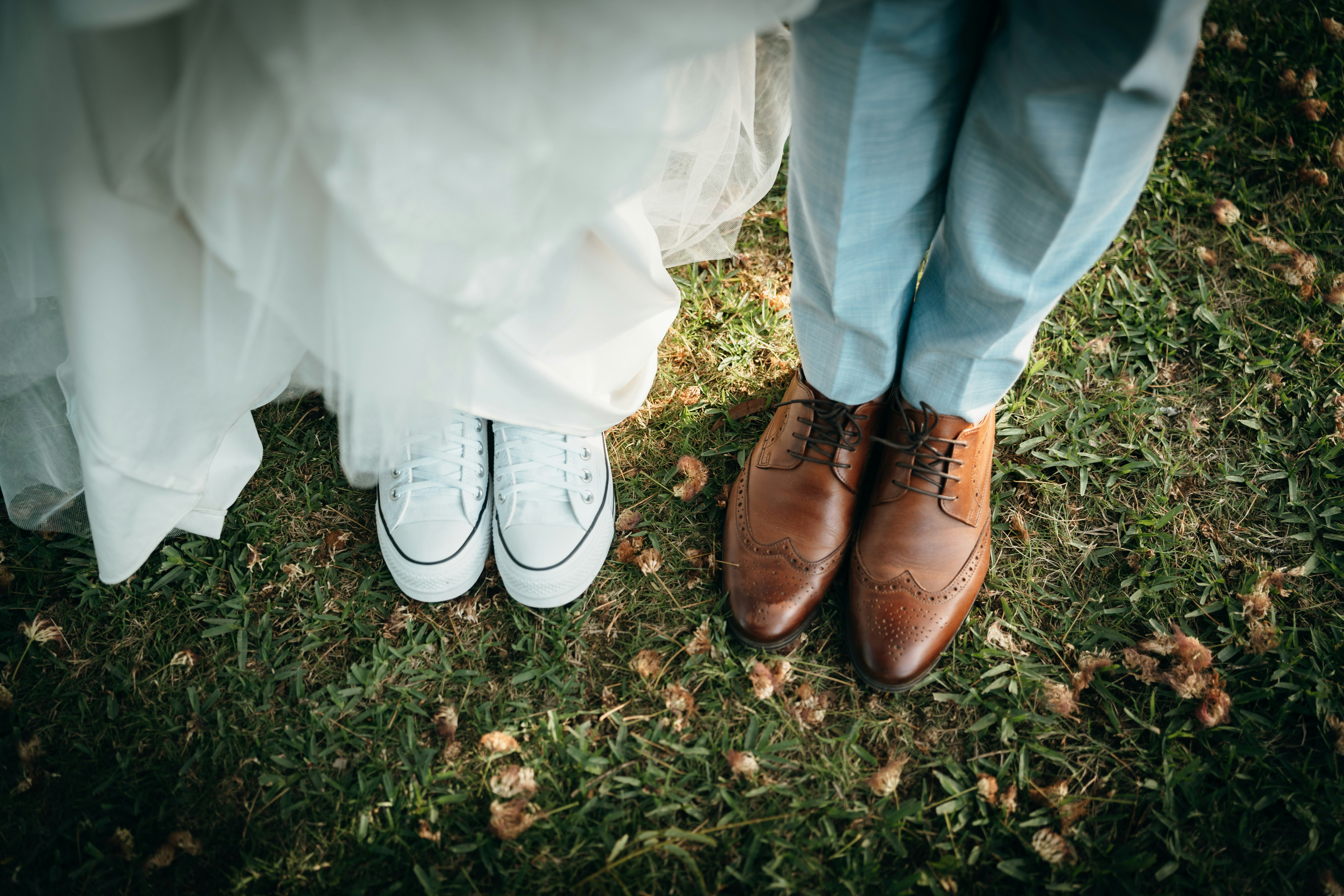 do it your own way. couple's shoes in their marriage at Douro Valley, Portugal. photo by Pedro Pulido Photography | Bride and groom's feet on grass