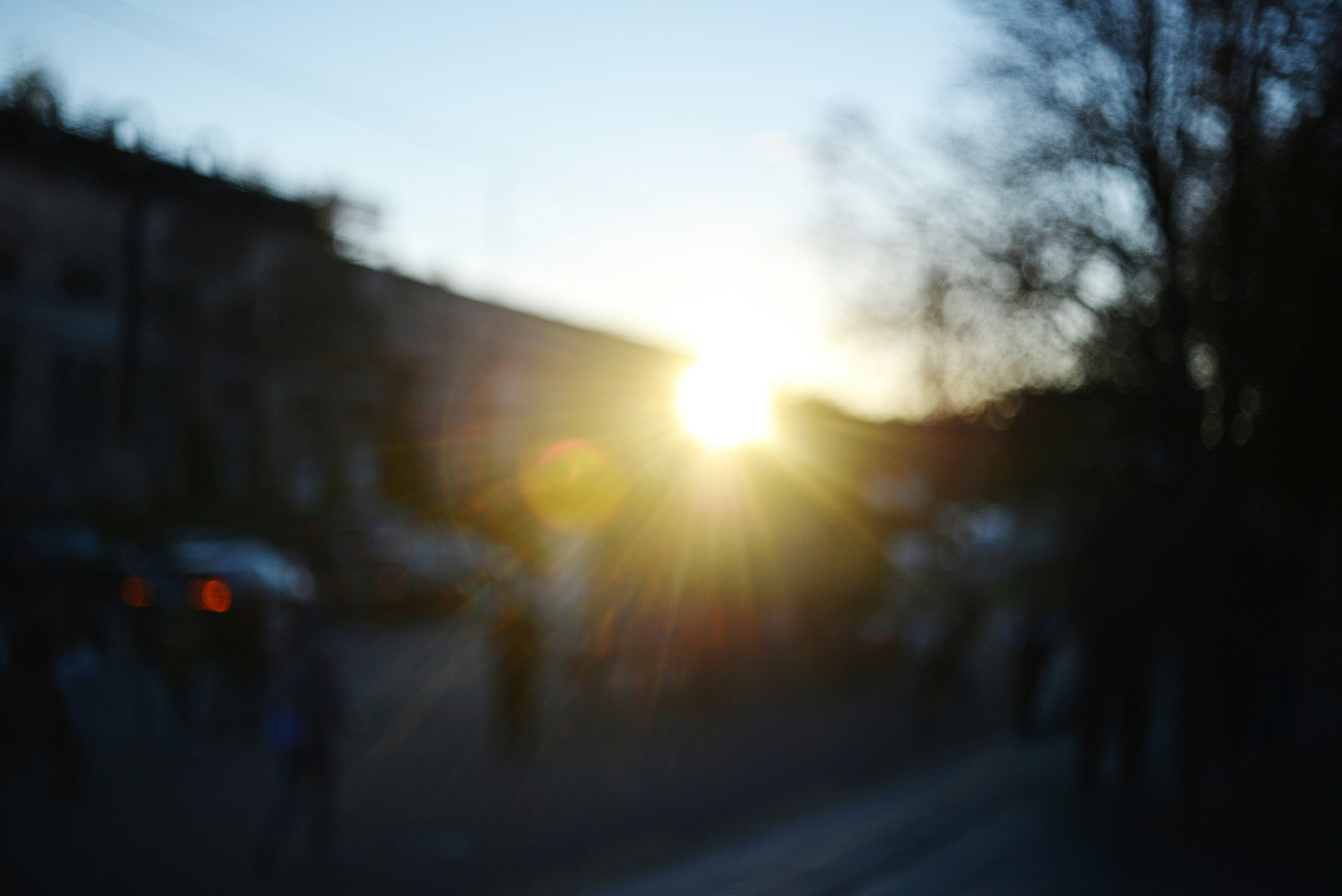 Dusk's Embrace: A Blurred Encounter with the Setting Sun