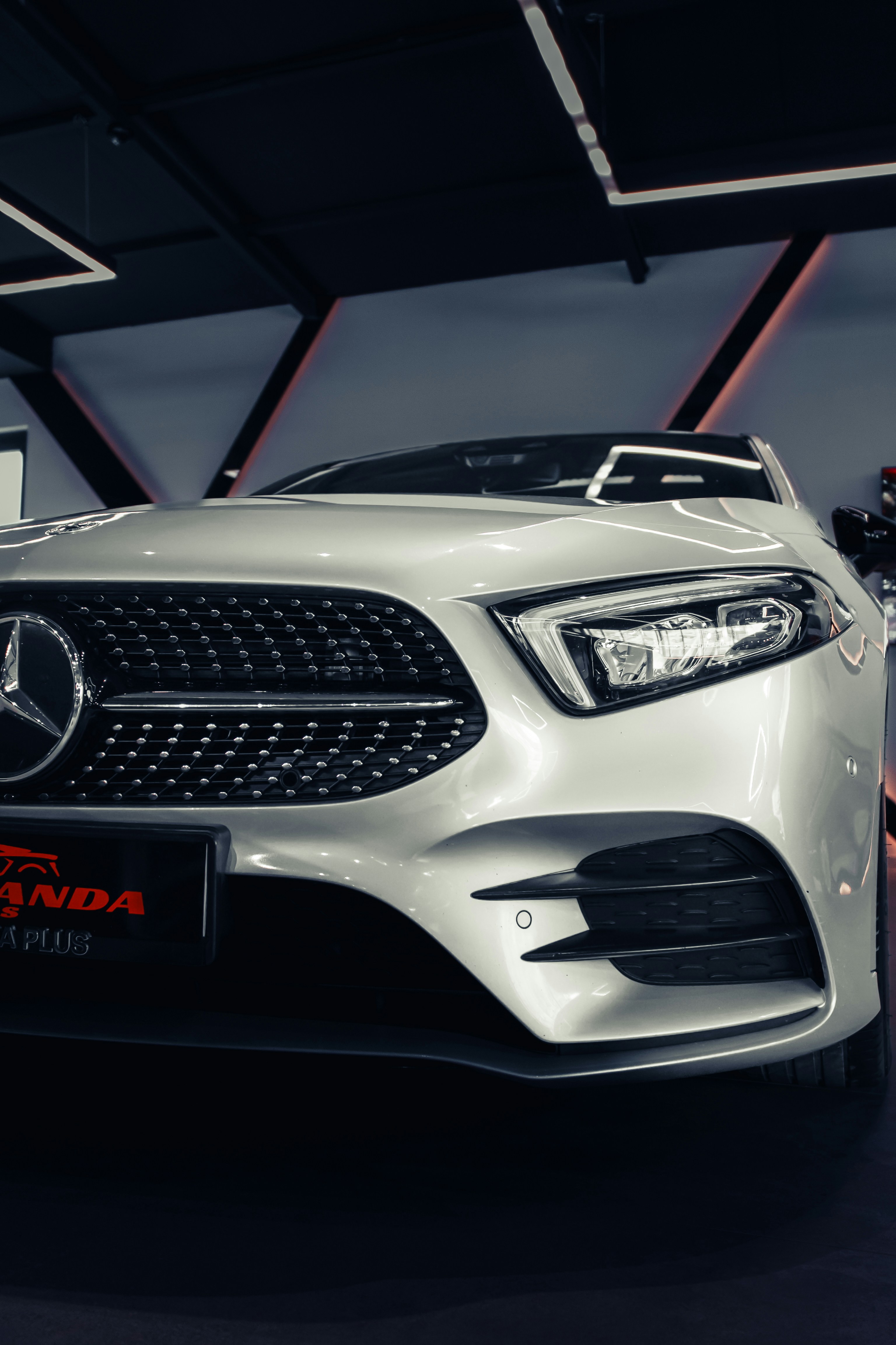 Low-Angle Glare: Mercedes-Benz Front End in Studio Light