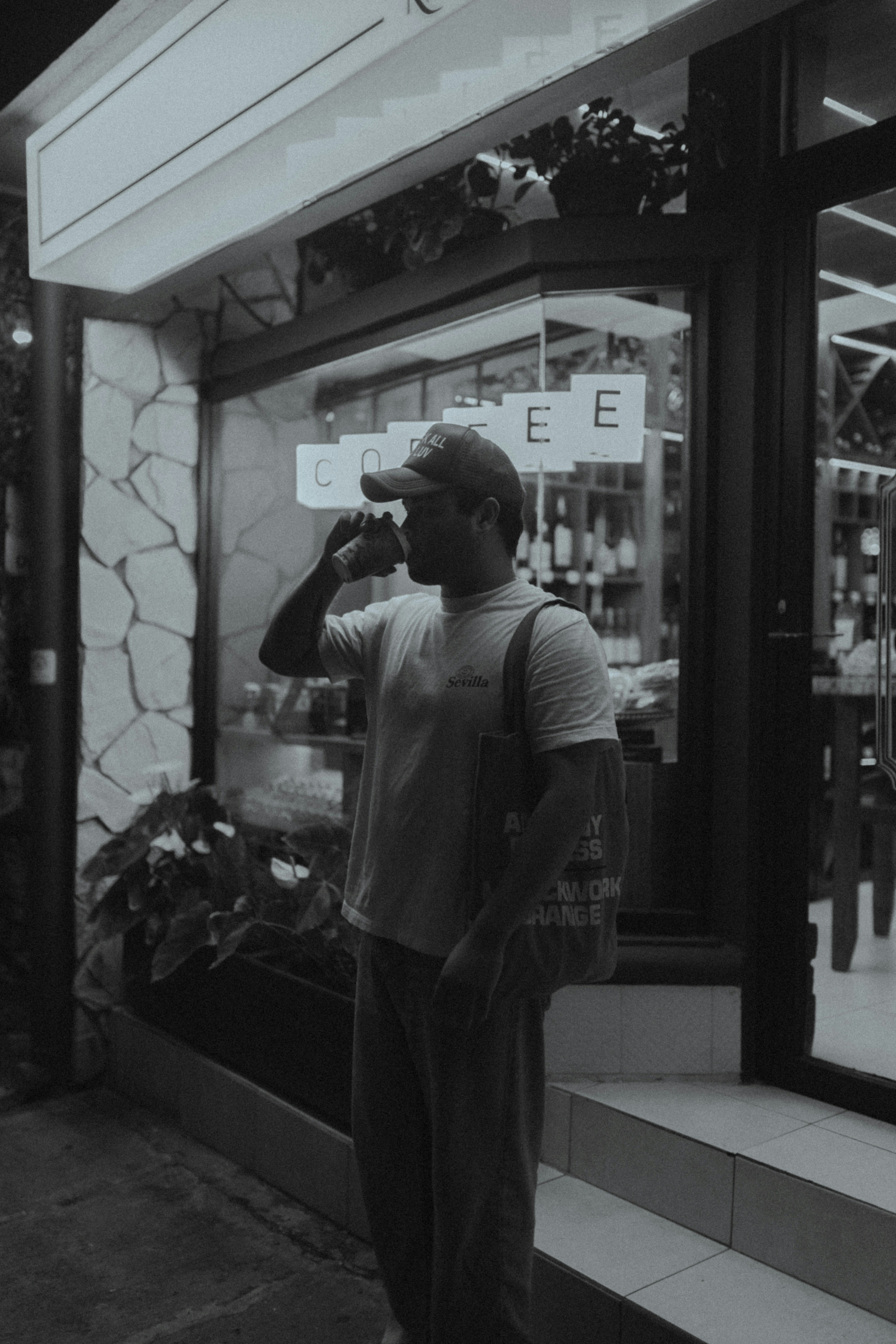 Sipping Serenity: A Moment in the Urban Night