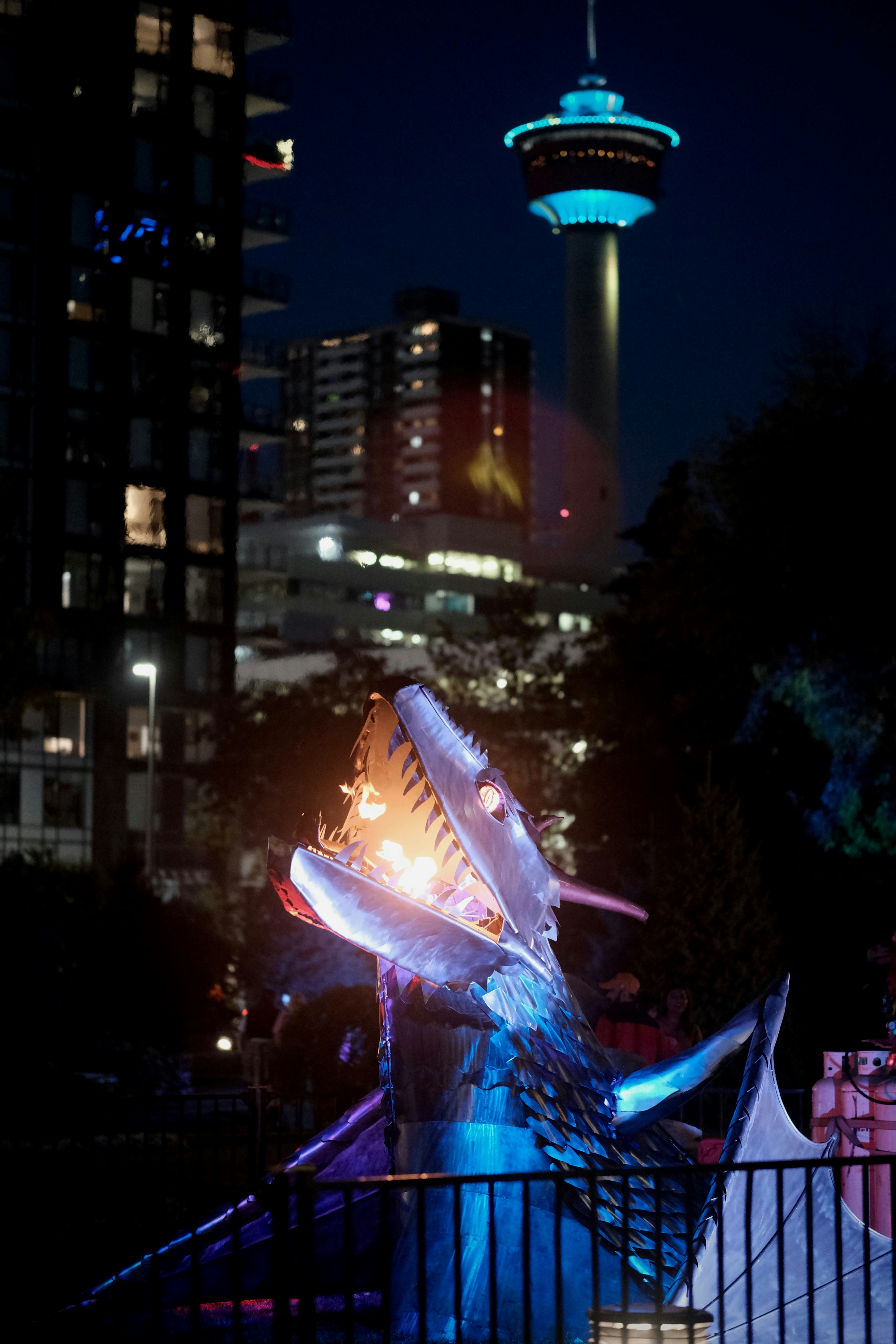 Fiery Dragon Amidst Urban Nightscape