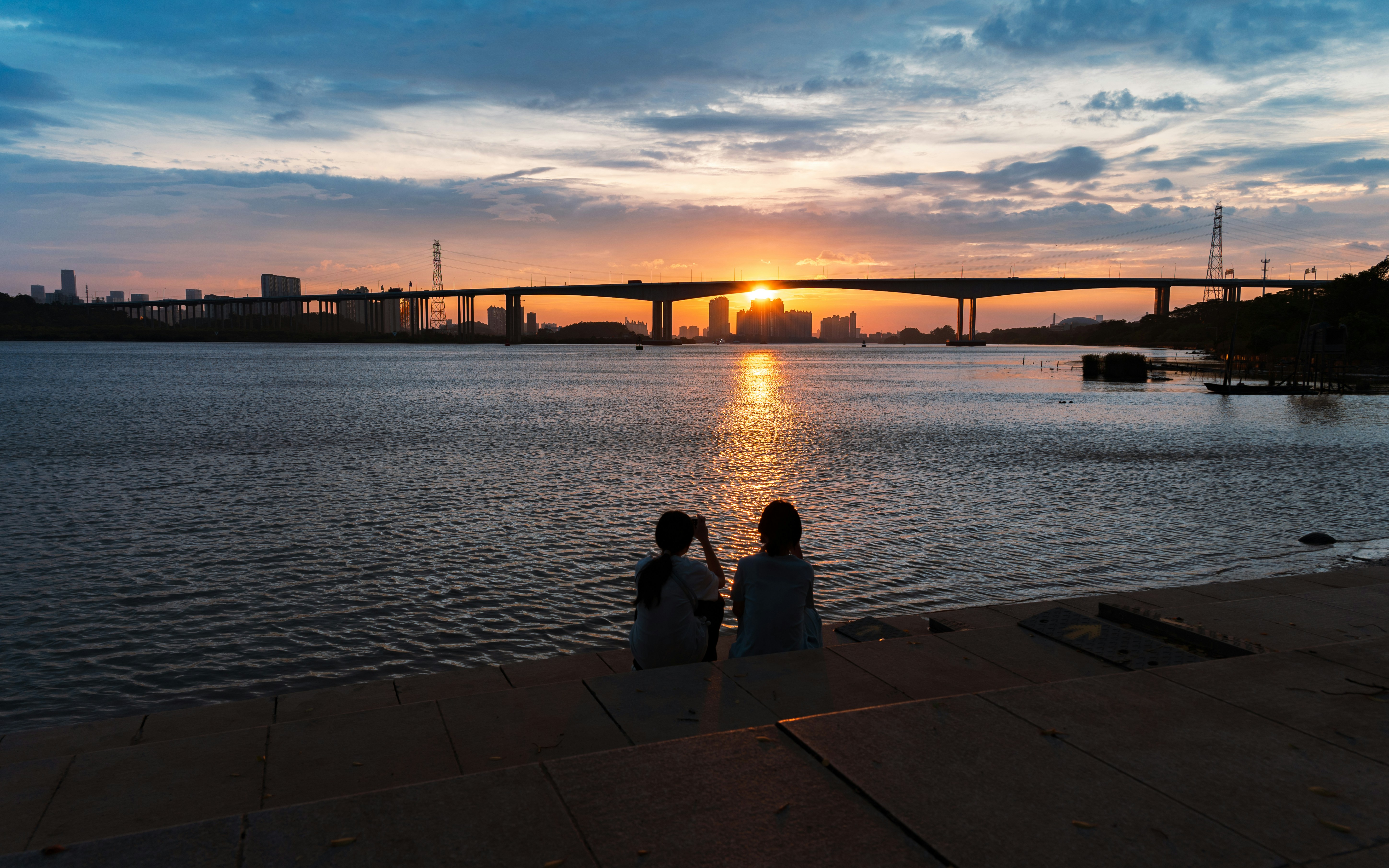 Twilight Reflections: A Moment by the Water