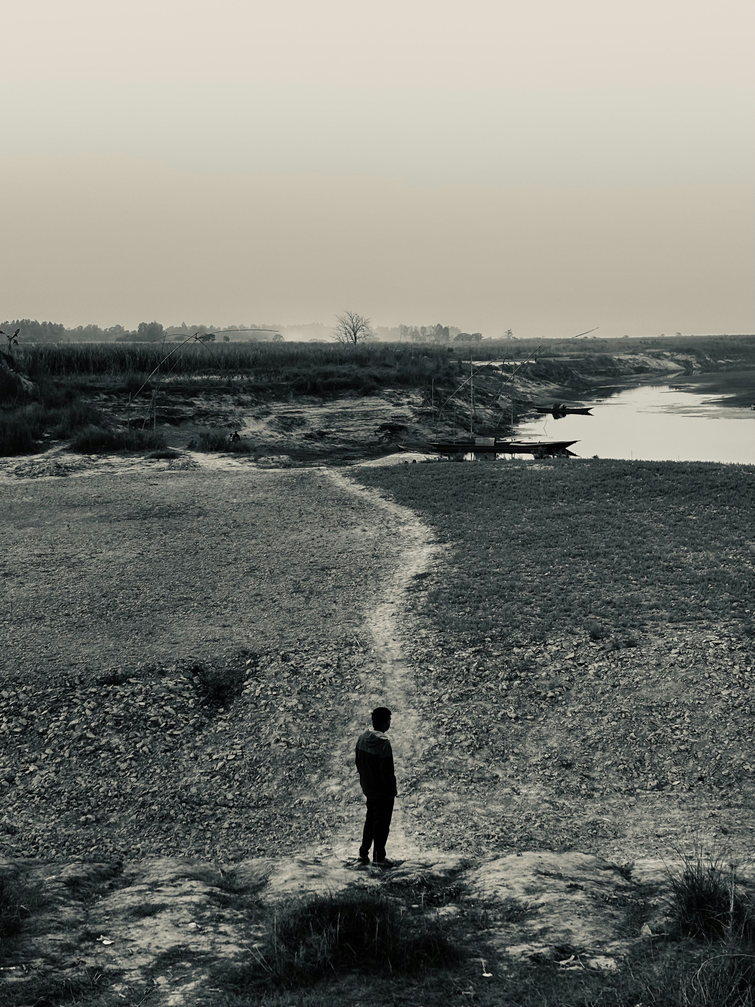 Life Map | Man standing on a path overlooking a river