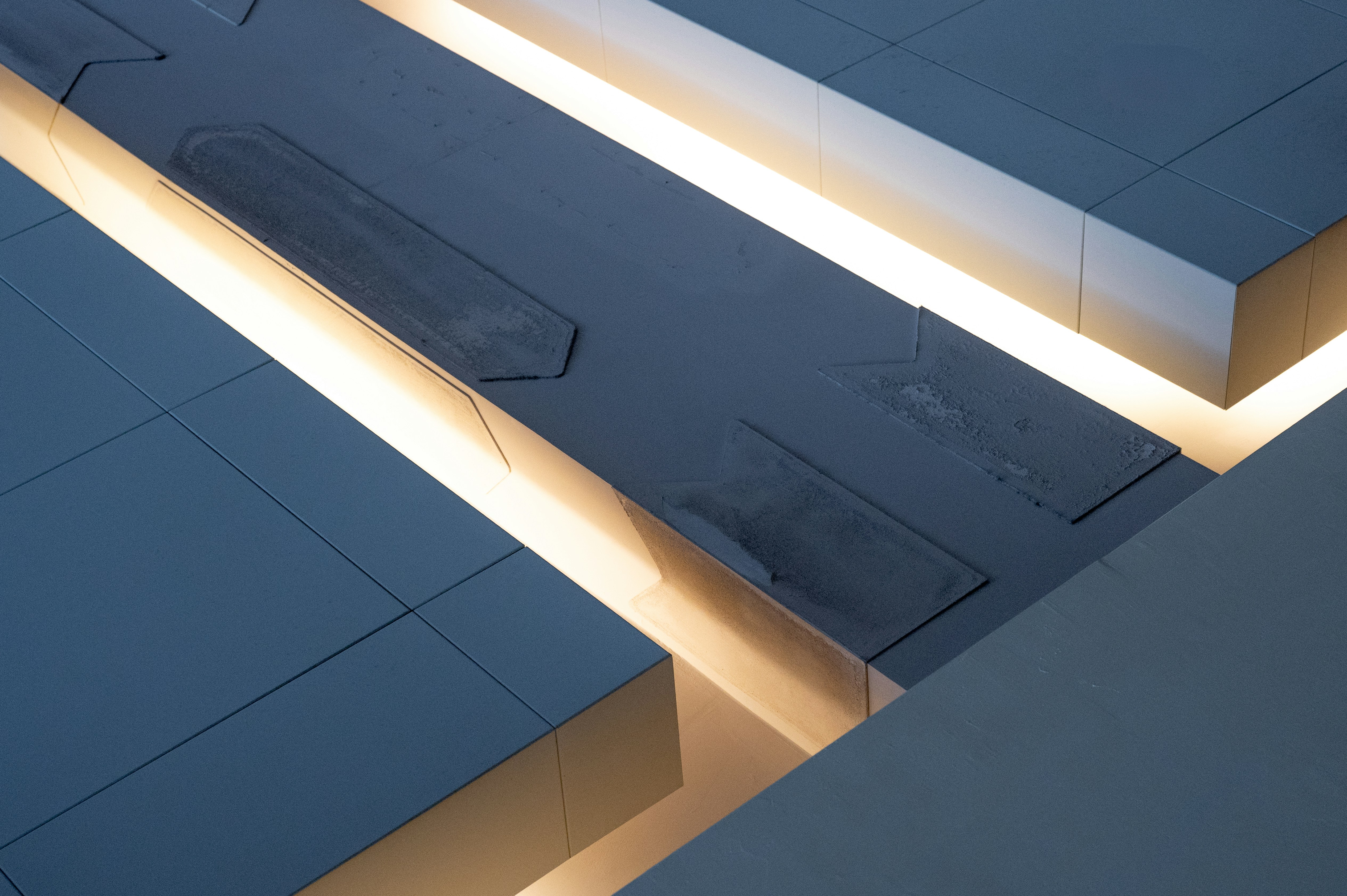 Geometric architectural elements with warm lighting