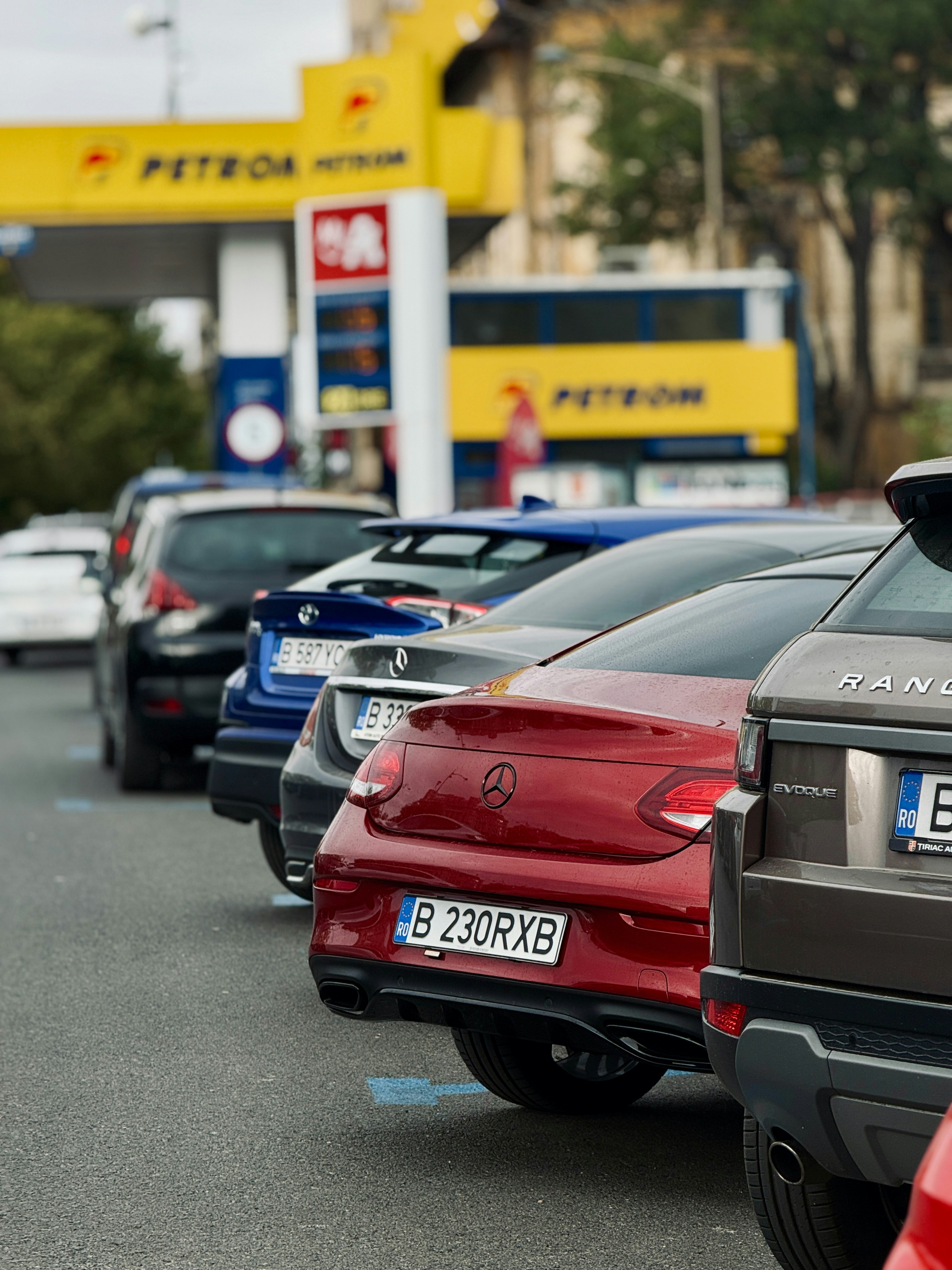 A Line of Luxury: Cars Awaiting Fuel