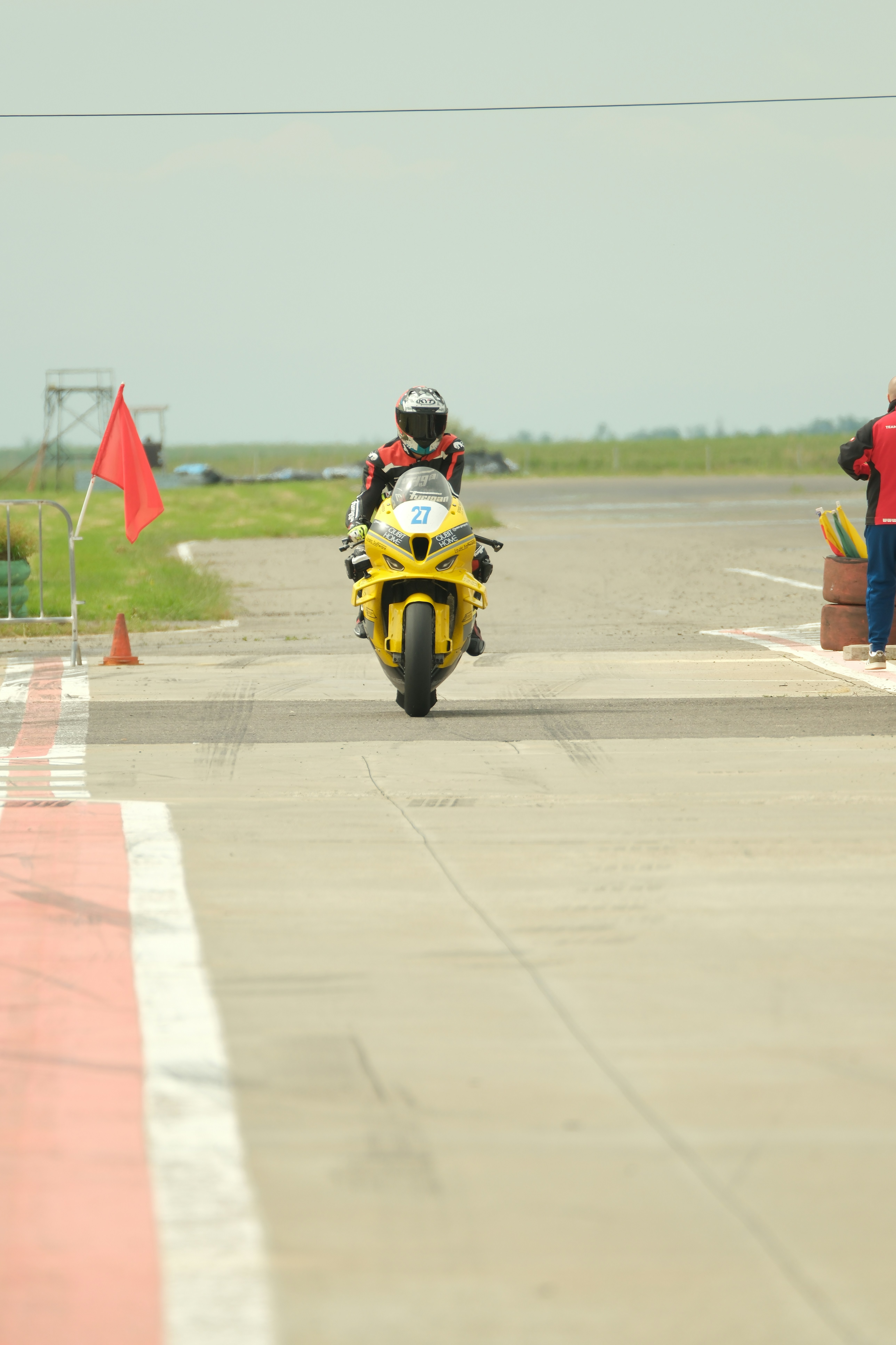 Racing Into Action: The Yellow Blur on the Track