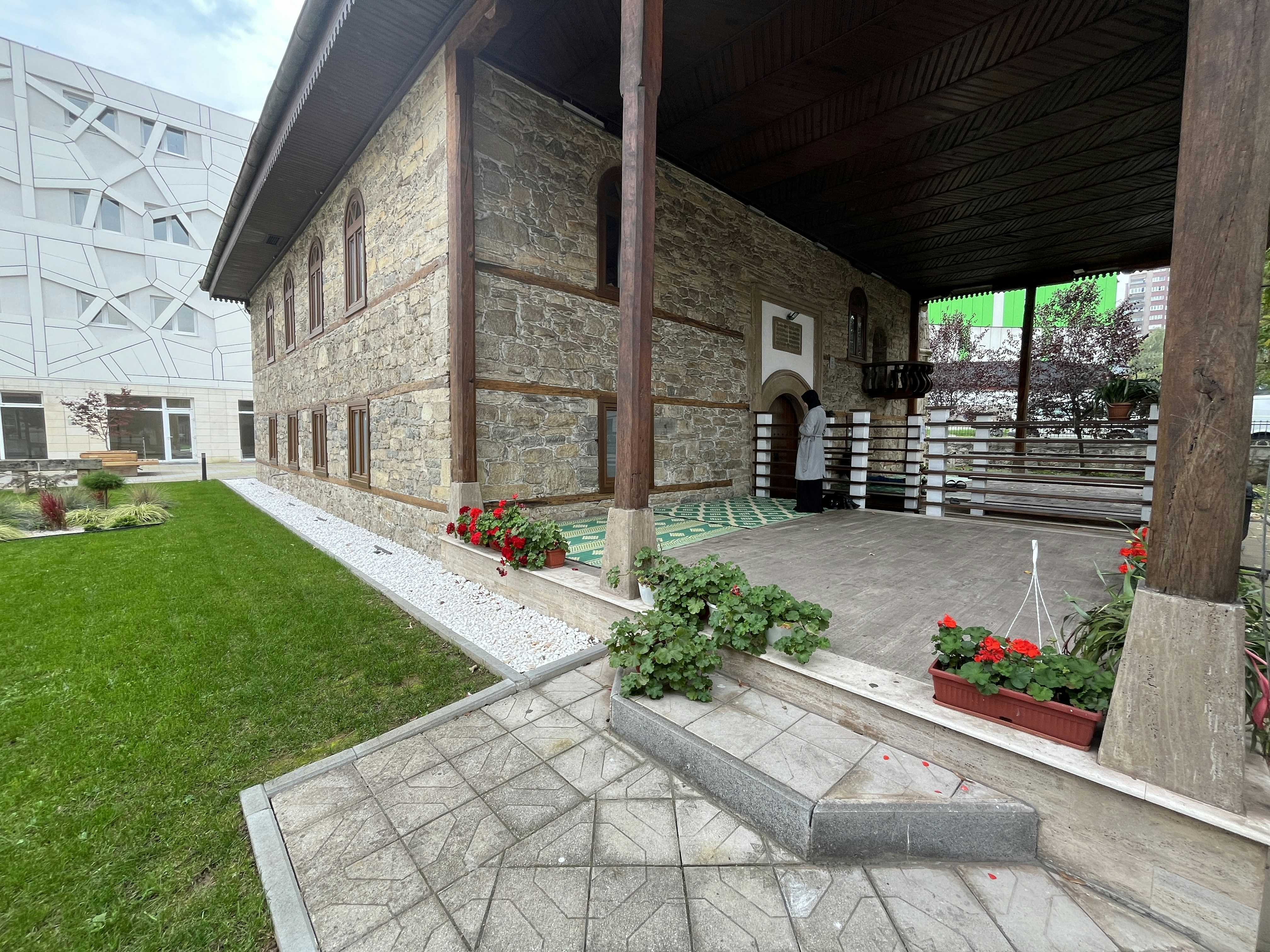 Sultan Ahmed Mosque | Historic stone building with wooden beams and covered porch.