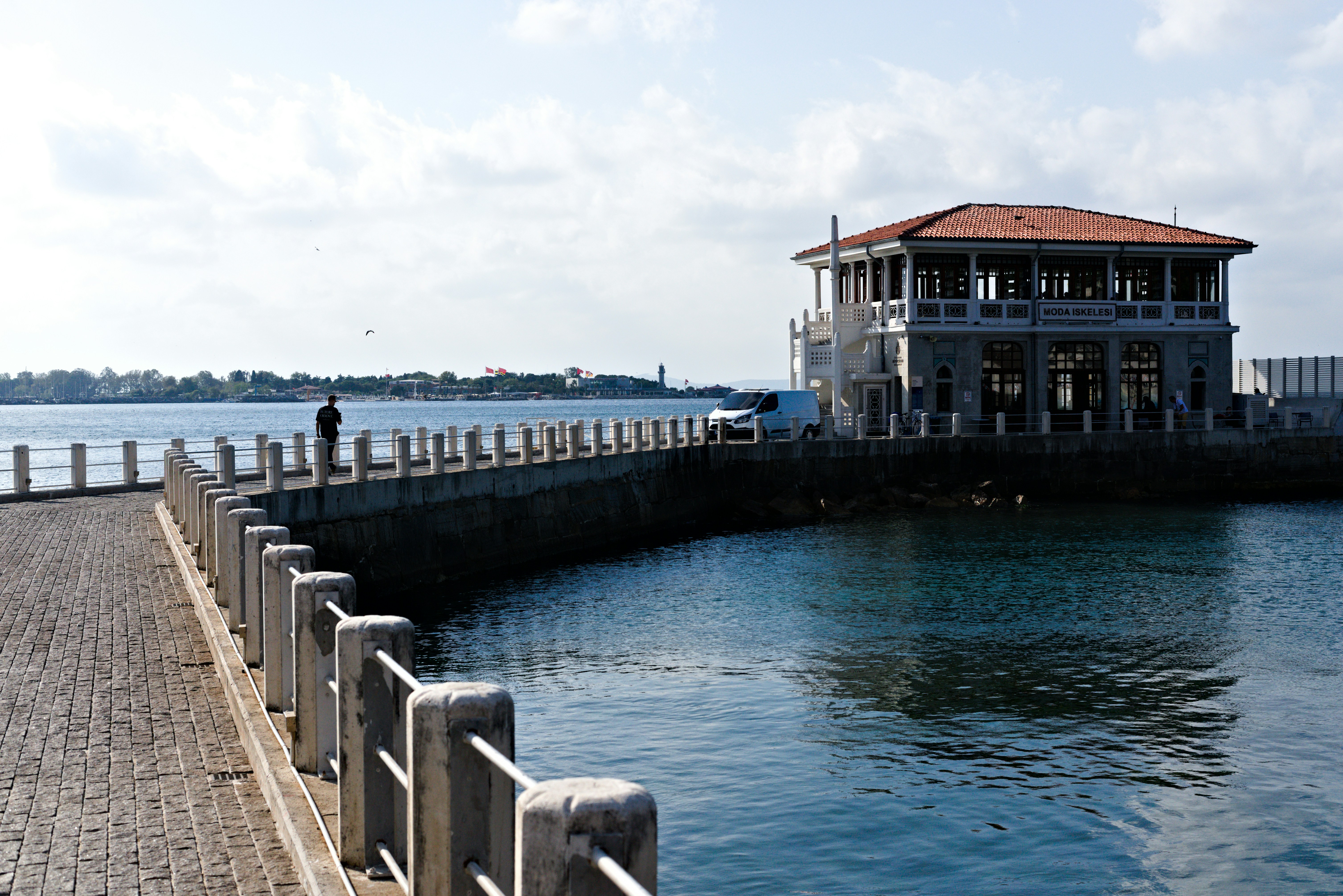 Harborfront Serenity: A Moment by the Water