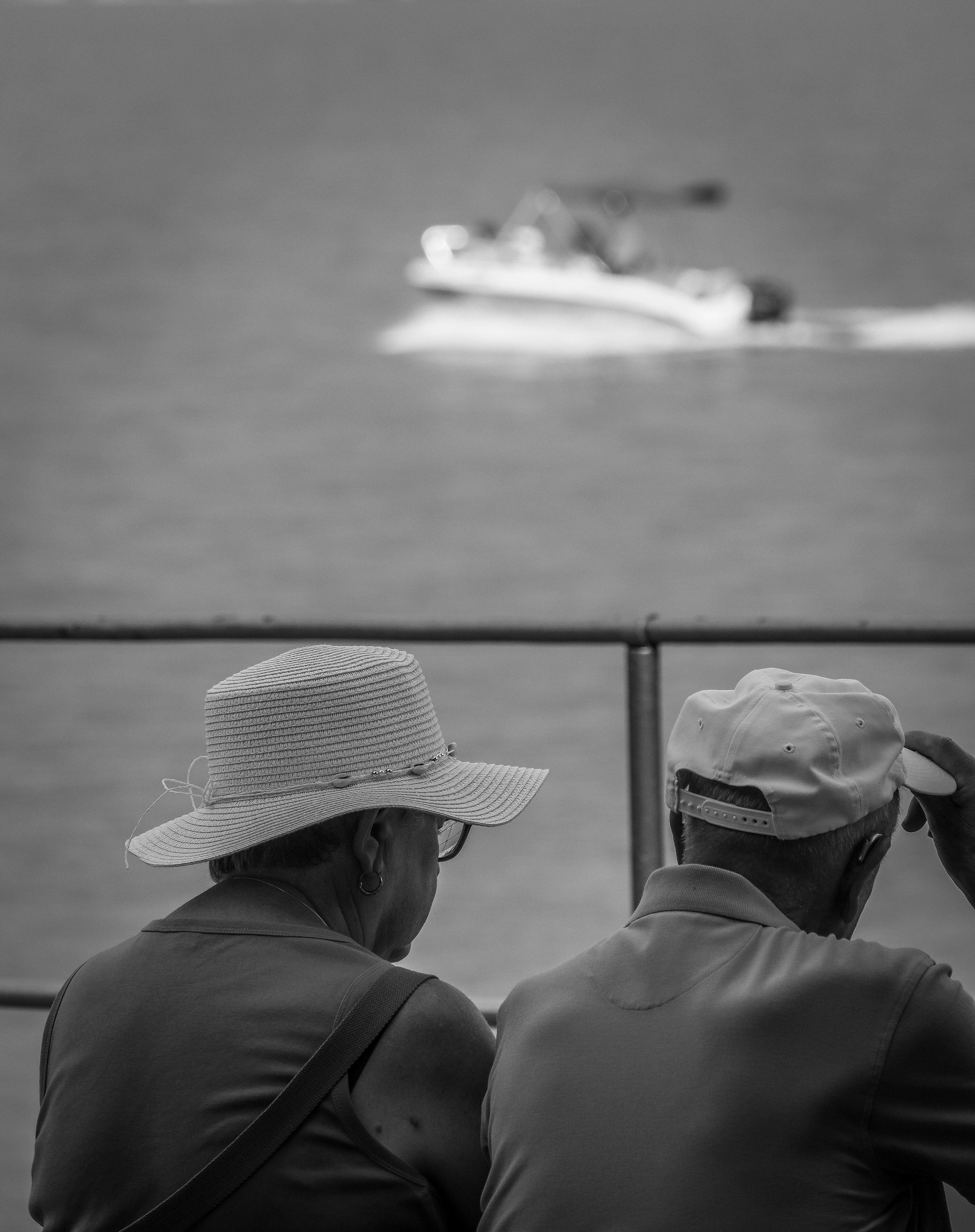 Reflections of Togetherness by the Water's Edge