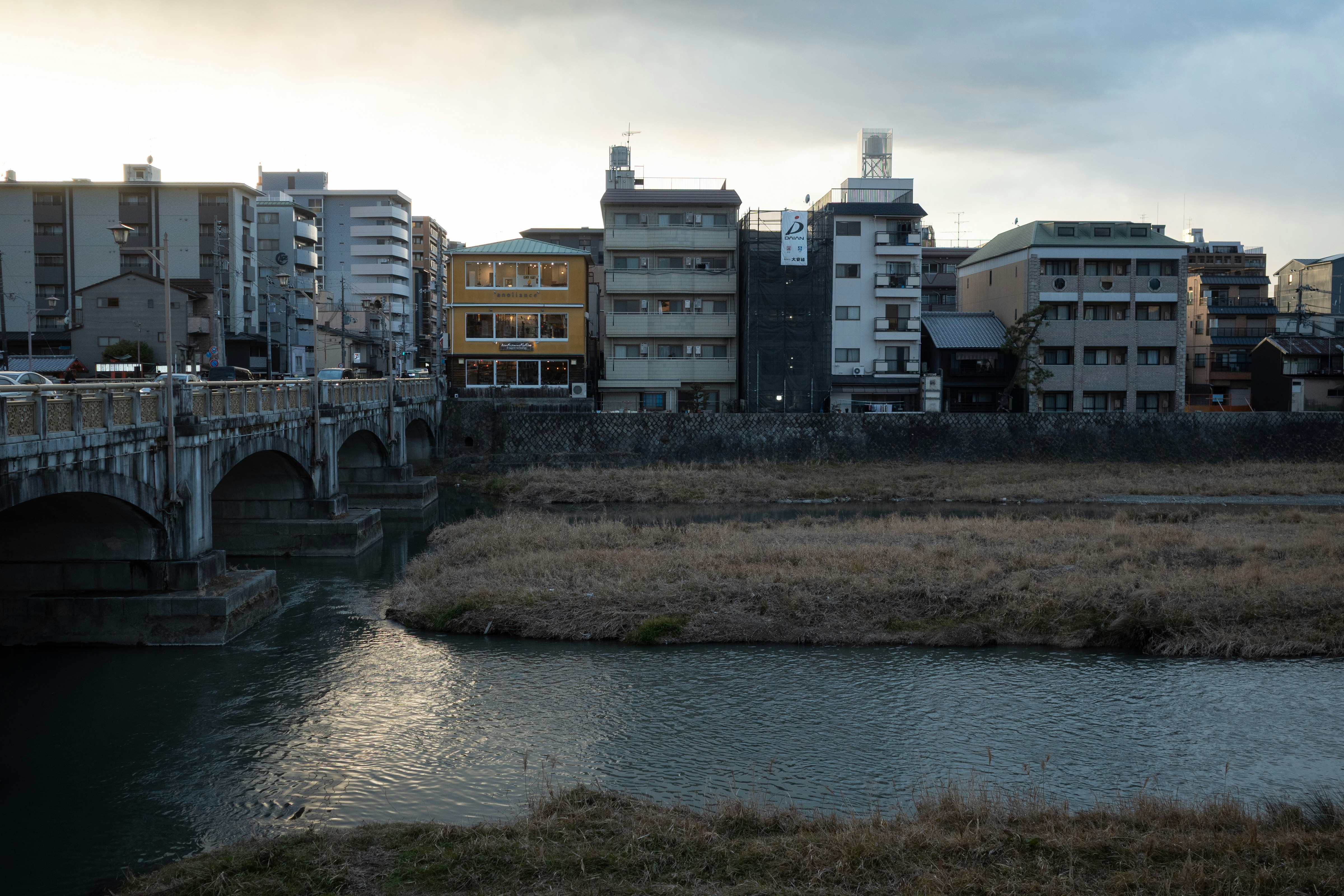 Urban Reflections: A River's Embrace