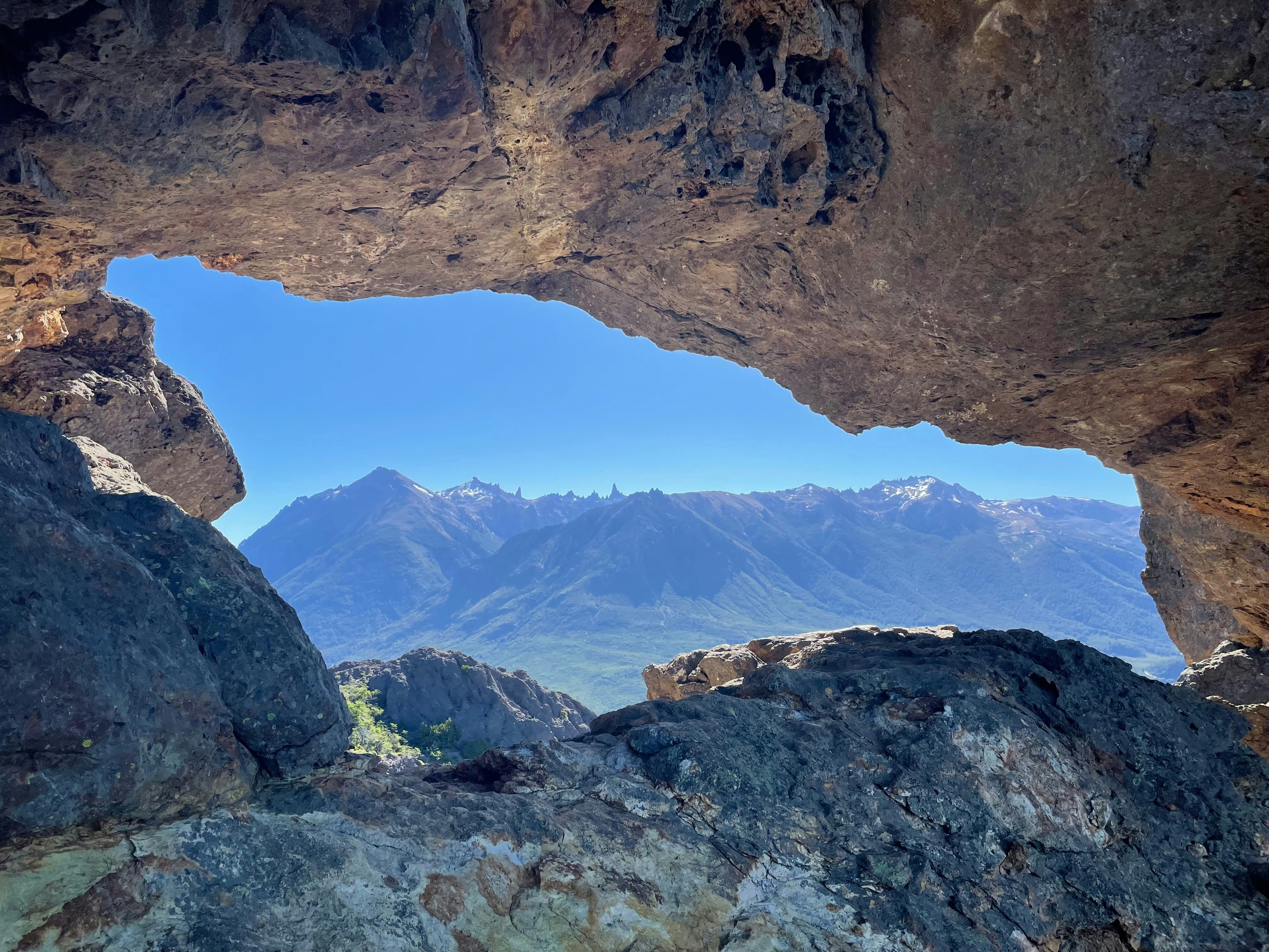 Natural Window: Valley Peaks Through a Stone Arch
