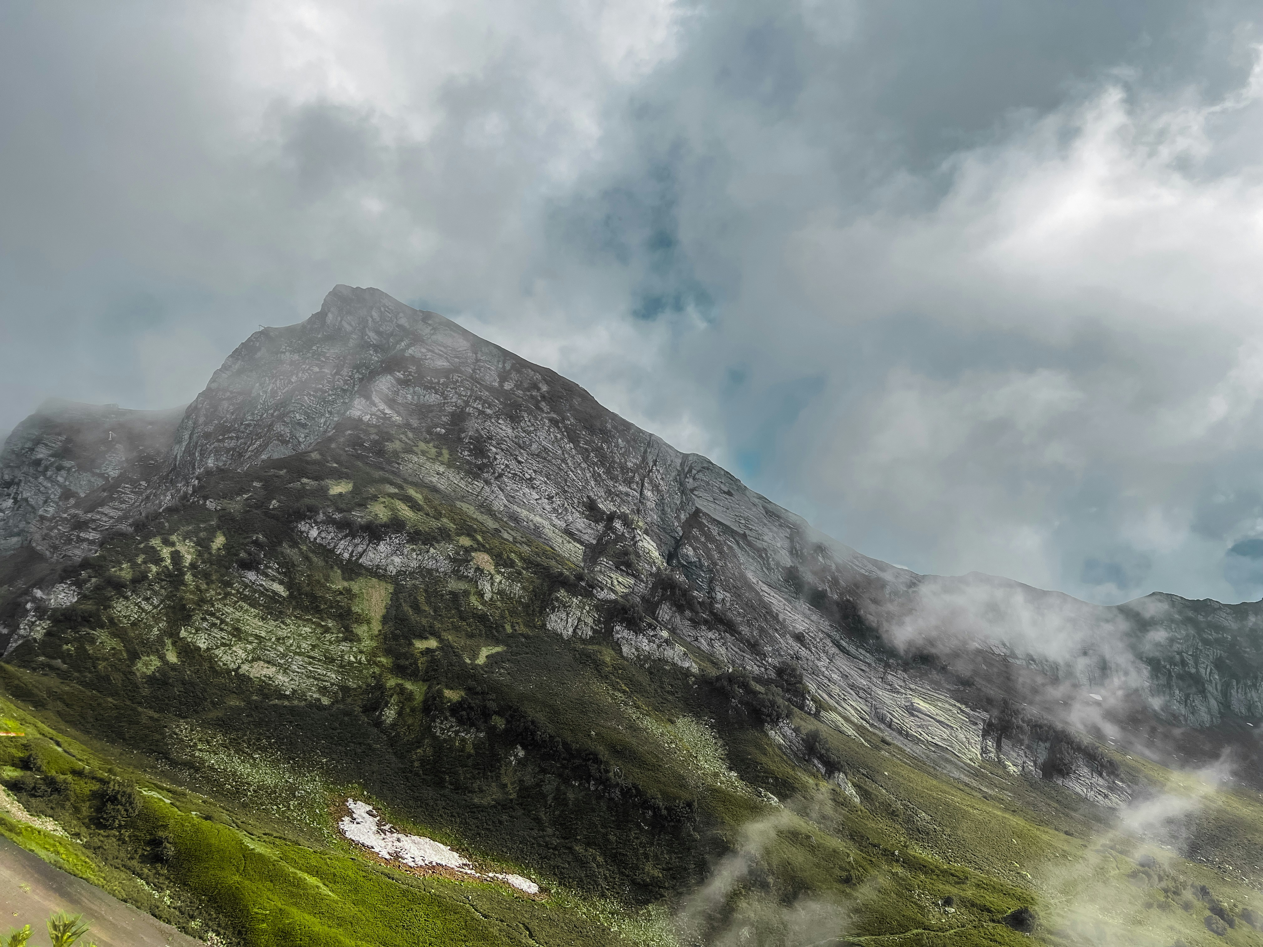 Whispers of the Mountain: A Dance with Clouds