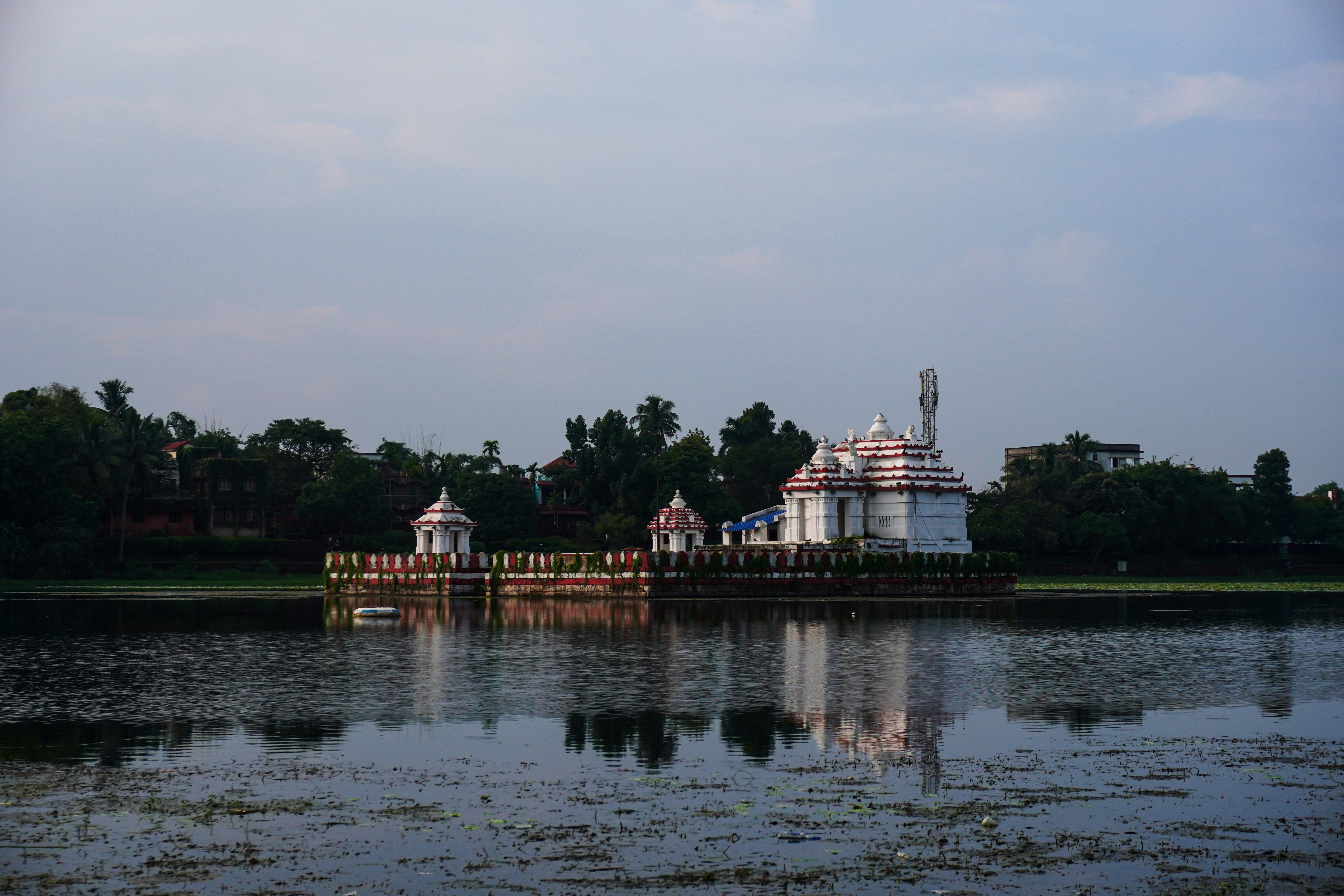 Reflections of Serenity: A Temple Amidst Tranquil Waters