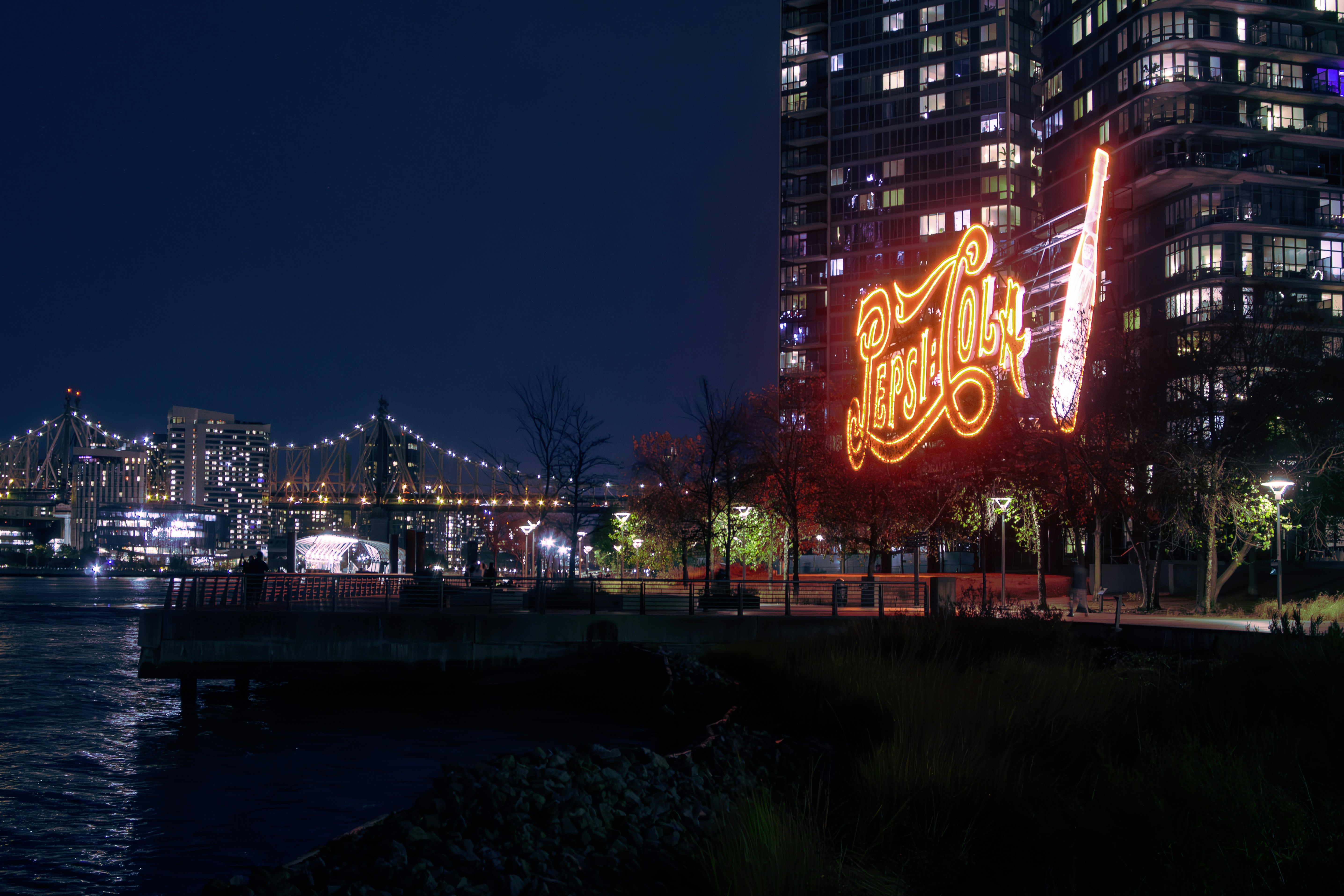 Neon Reflections: A Night by the River