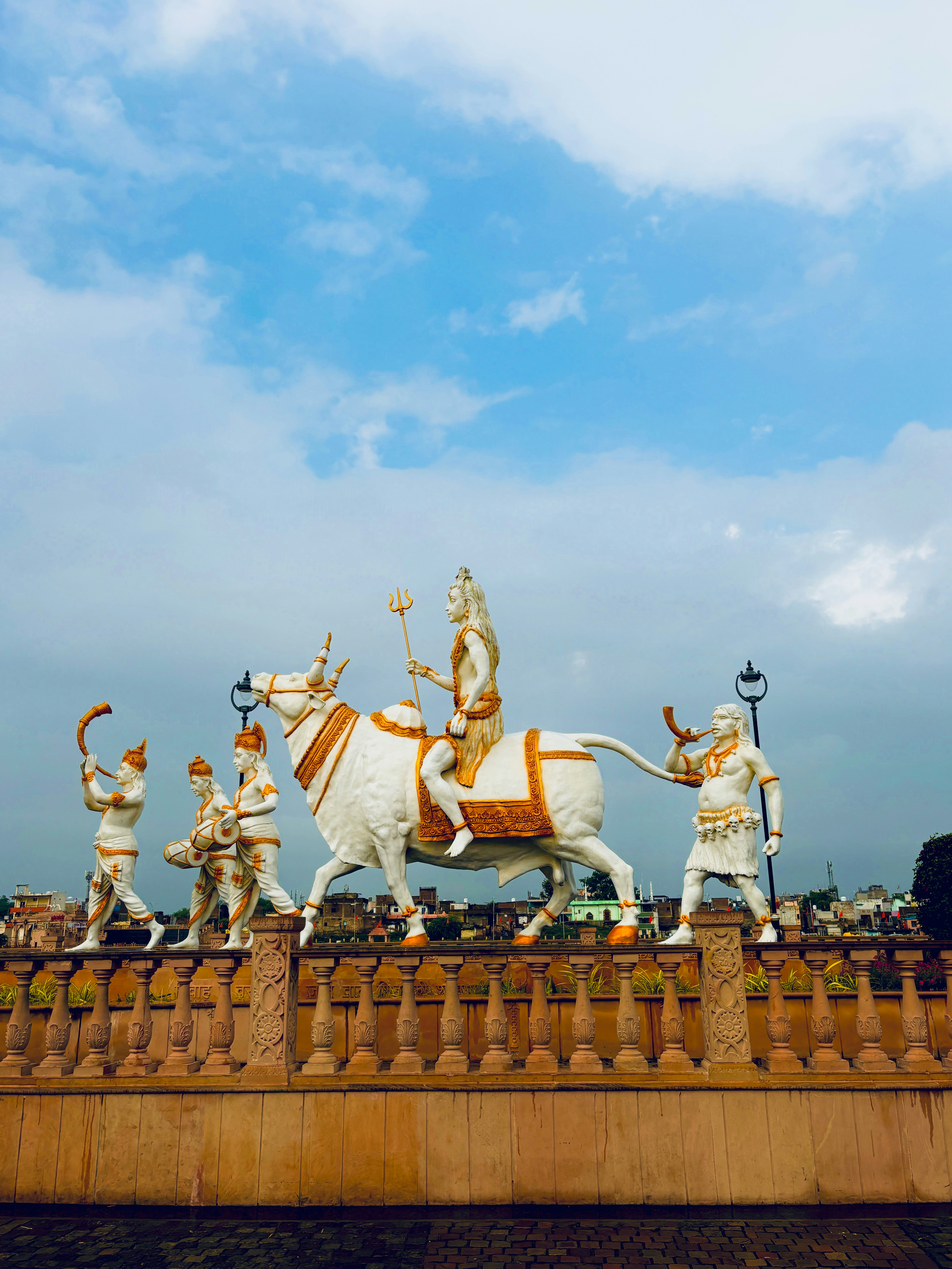Statue of shiva riding nandi with attendants photo – Free Worship Image ...