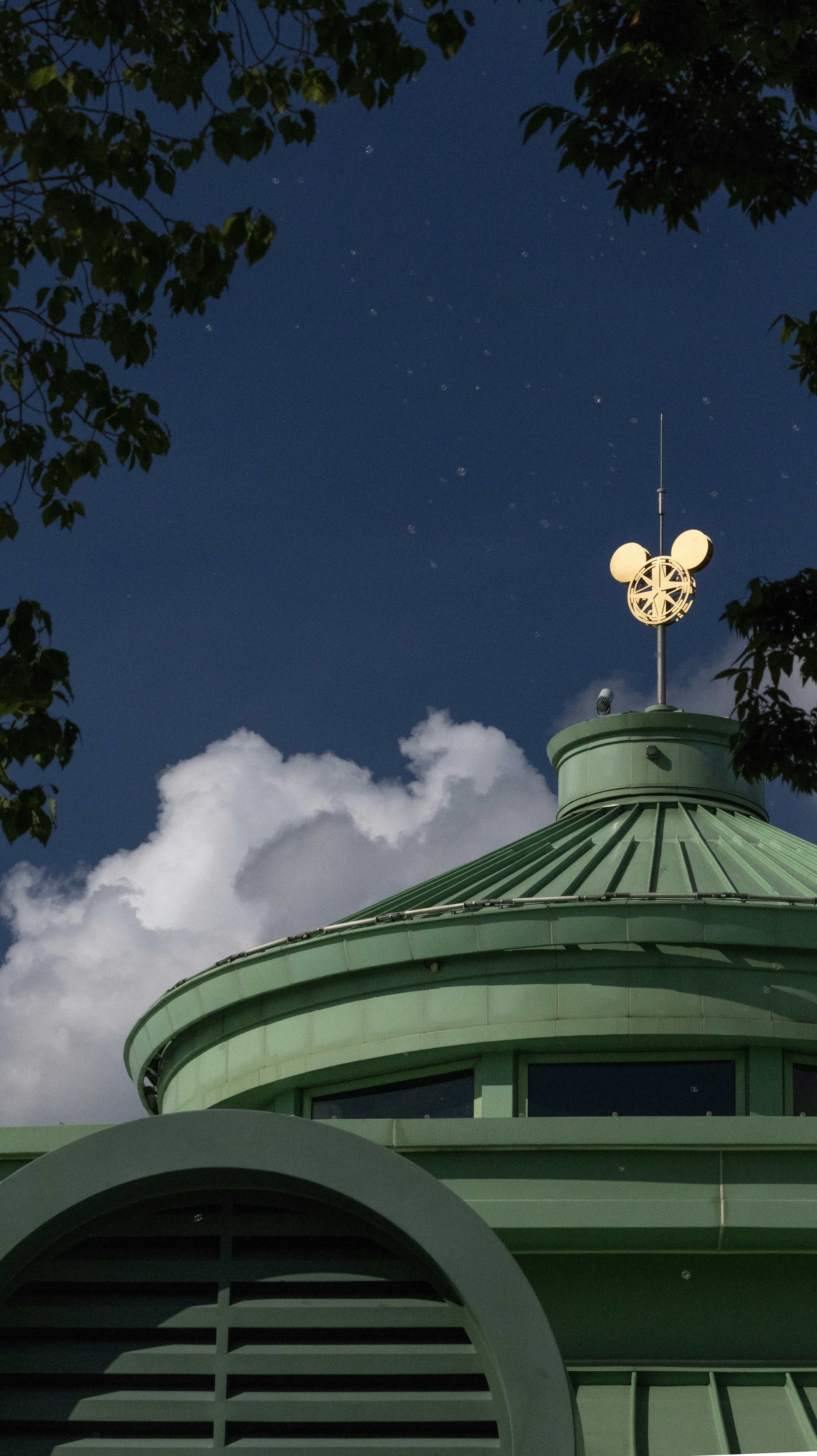 store of Disneyland | Green domed building with mickey mouse ears on top.