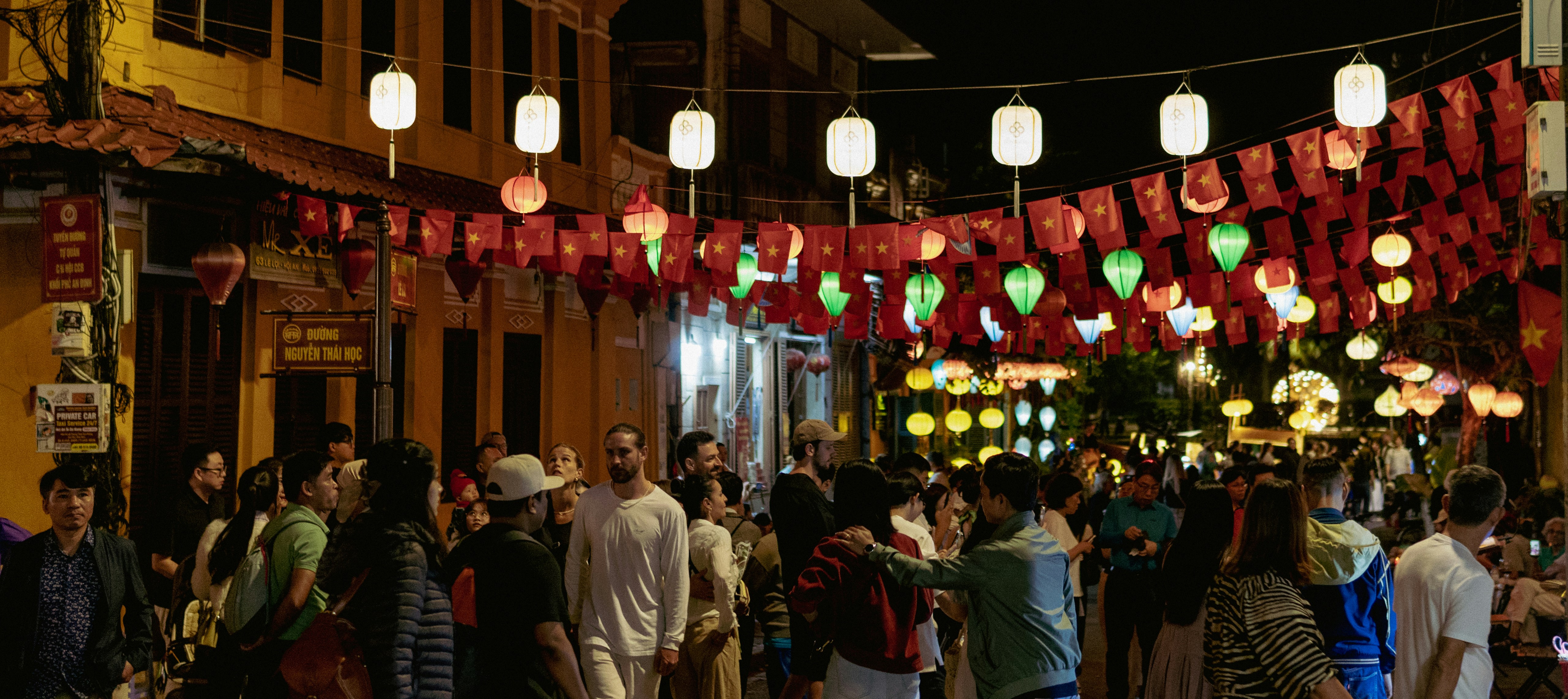 Illuminated Festivities: A Night Market Gathering