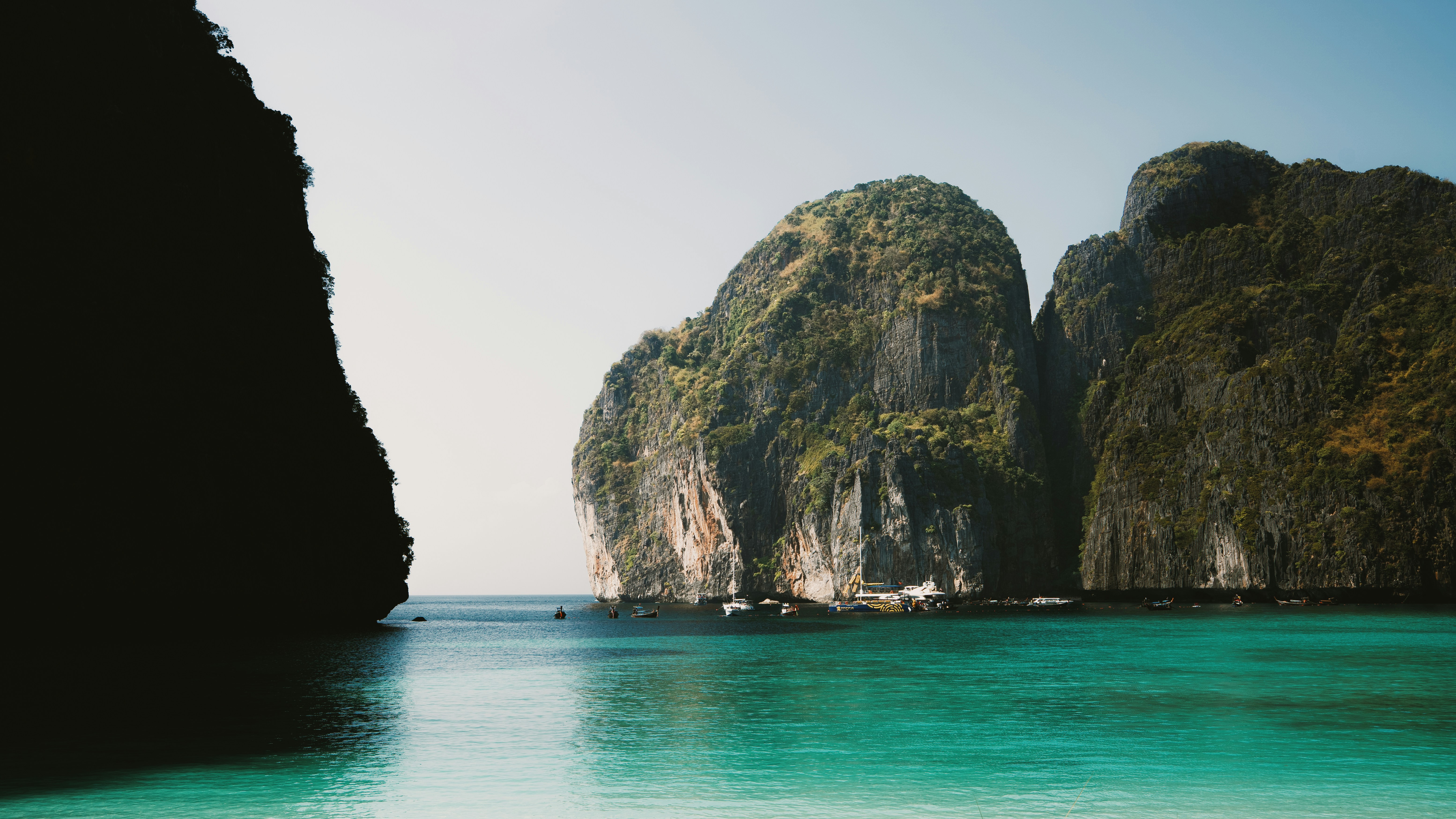 Turquoise water and rocky islands under a clear sky