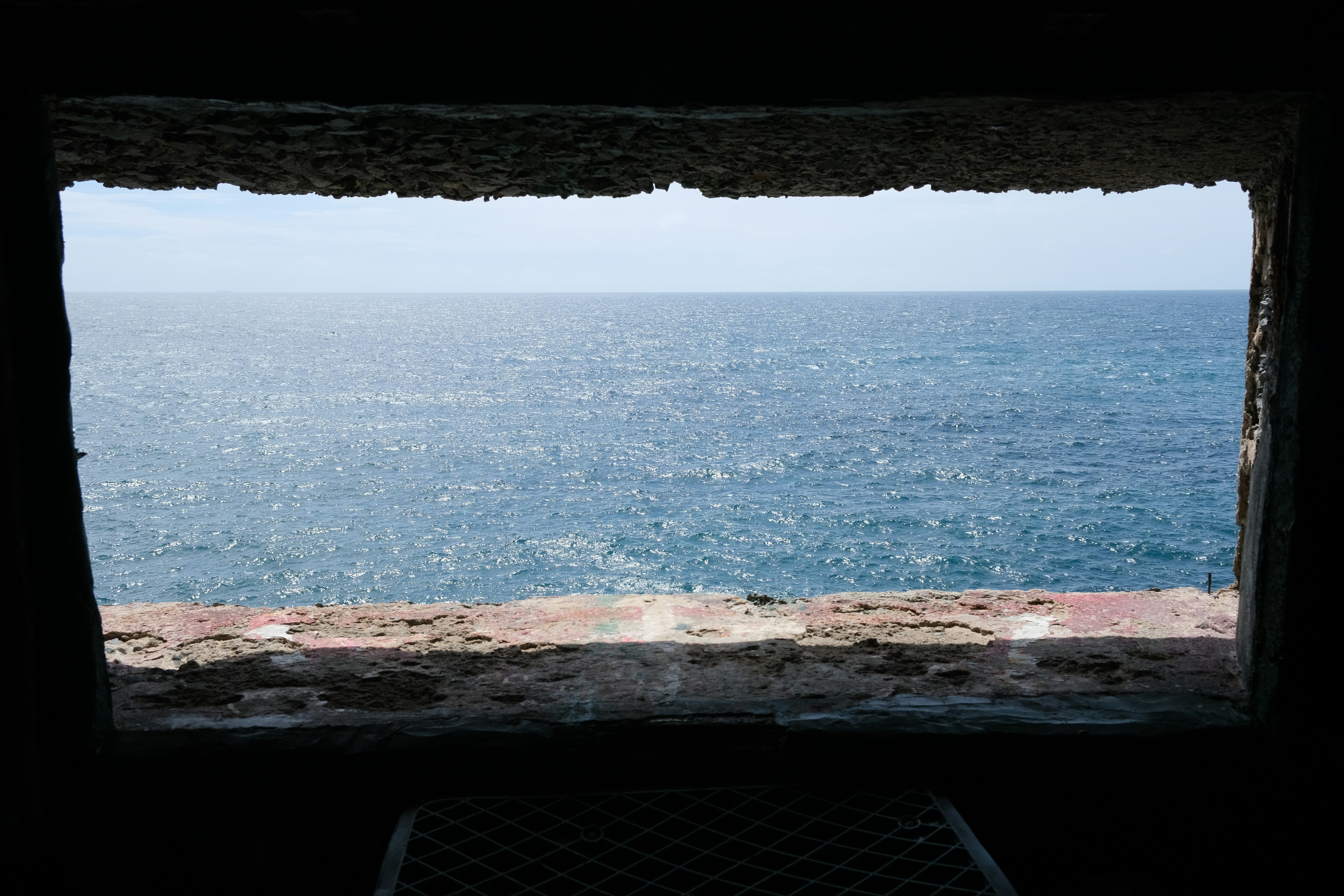 Framed Serenity: A Window to the Infinite Blue