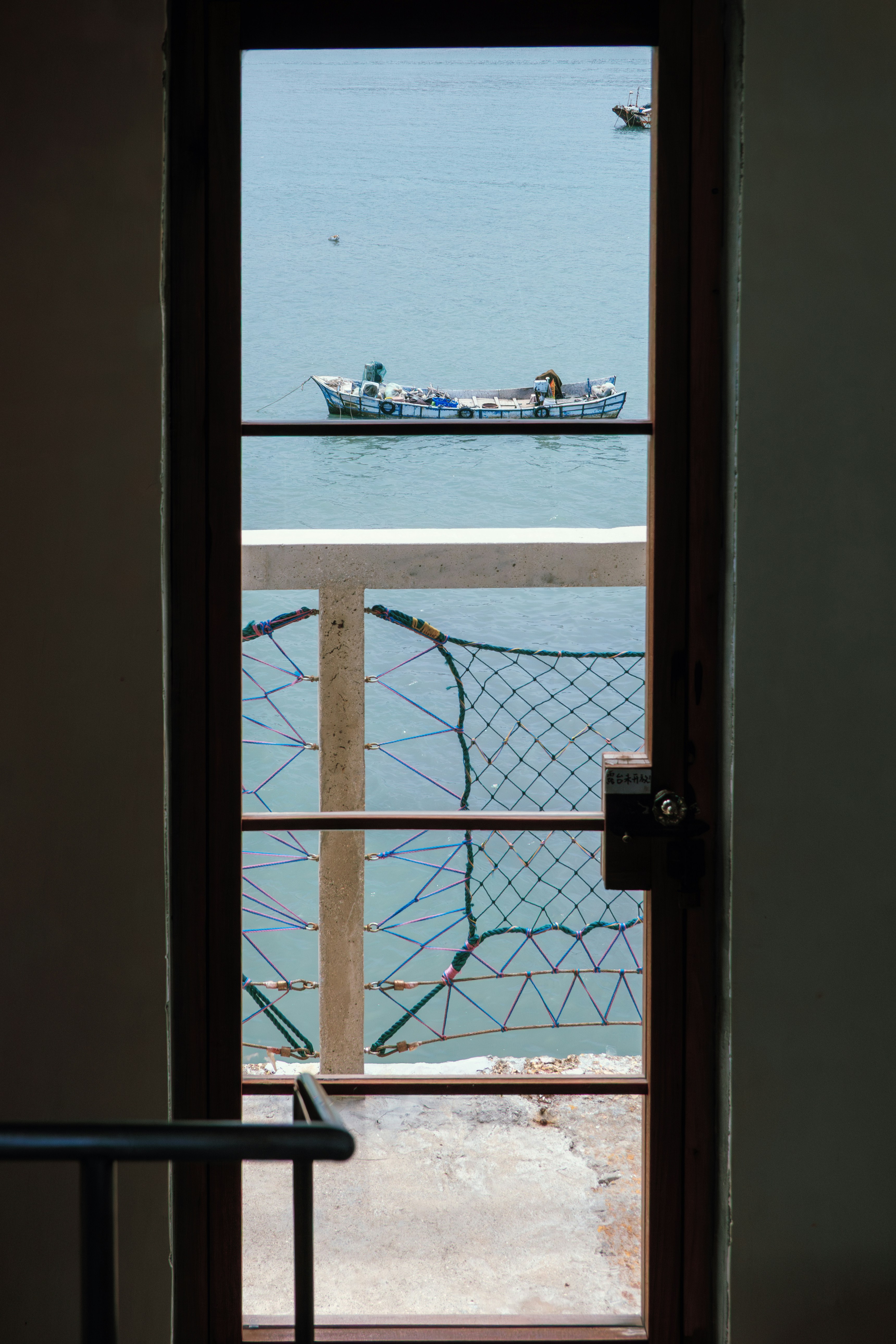 Framed Serenity: A Glimpse of Coastal Life