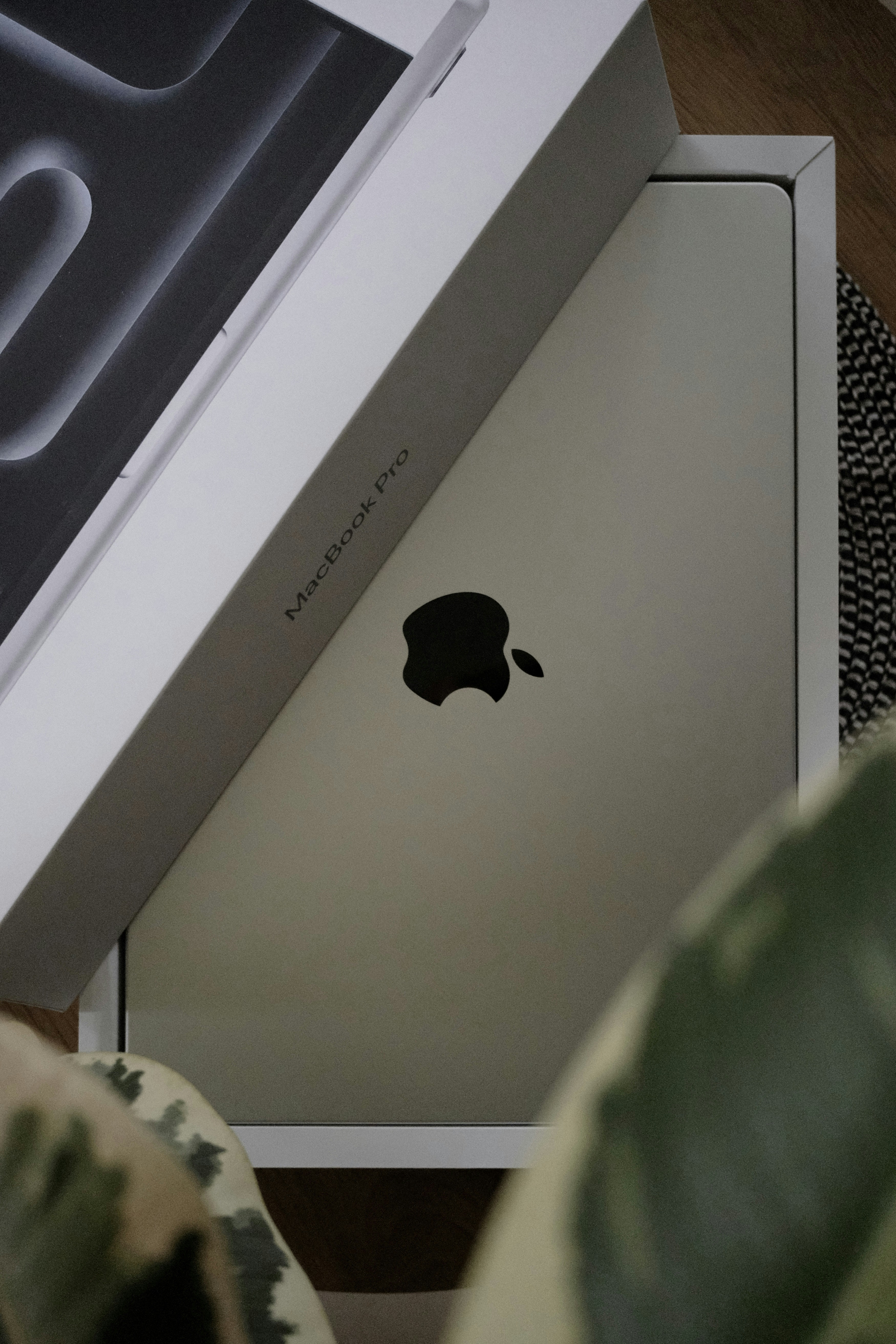 Silver macbook pro in its box