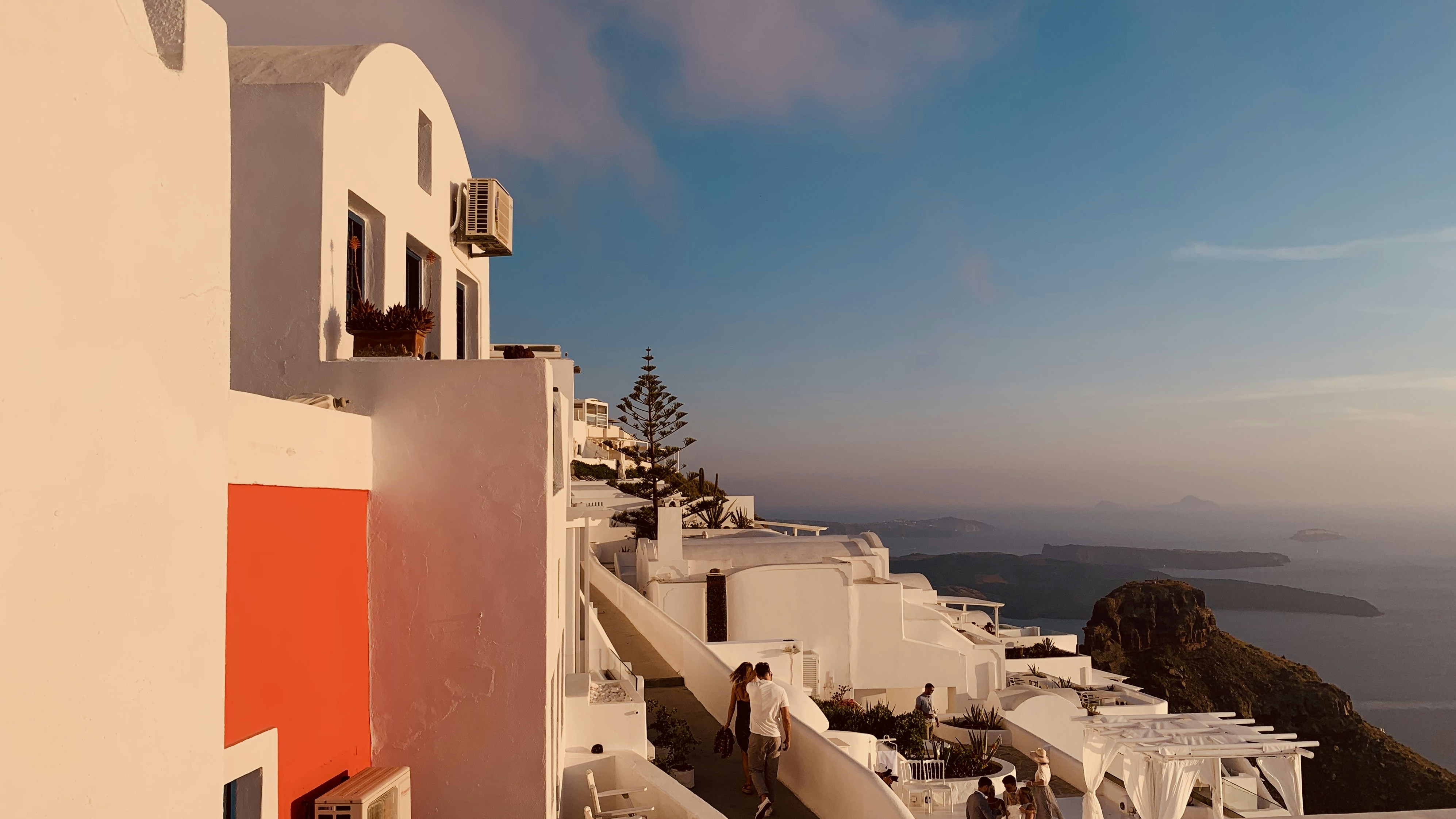 Sunset Serenity Over Santorini's Cliffs