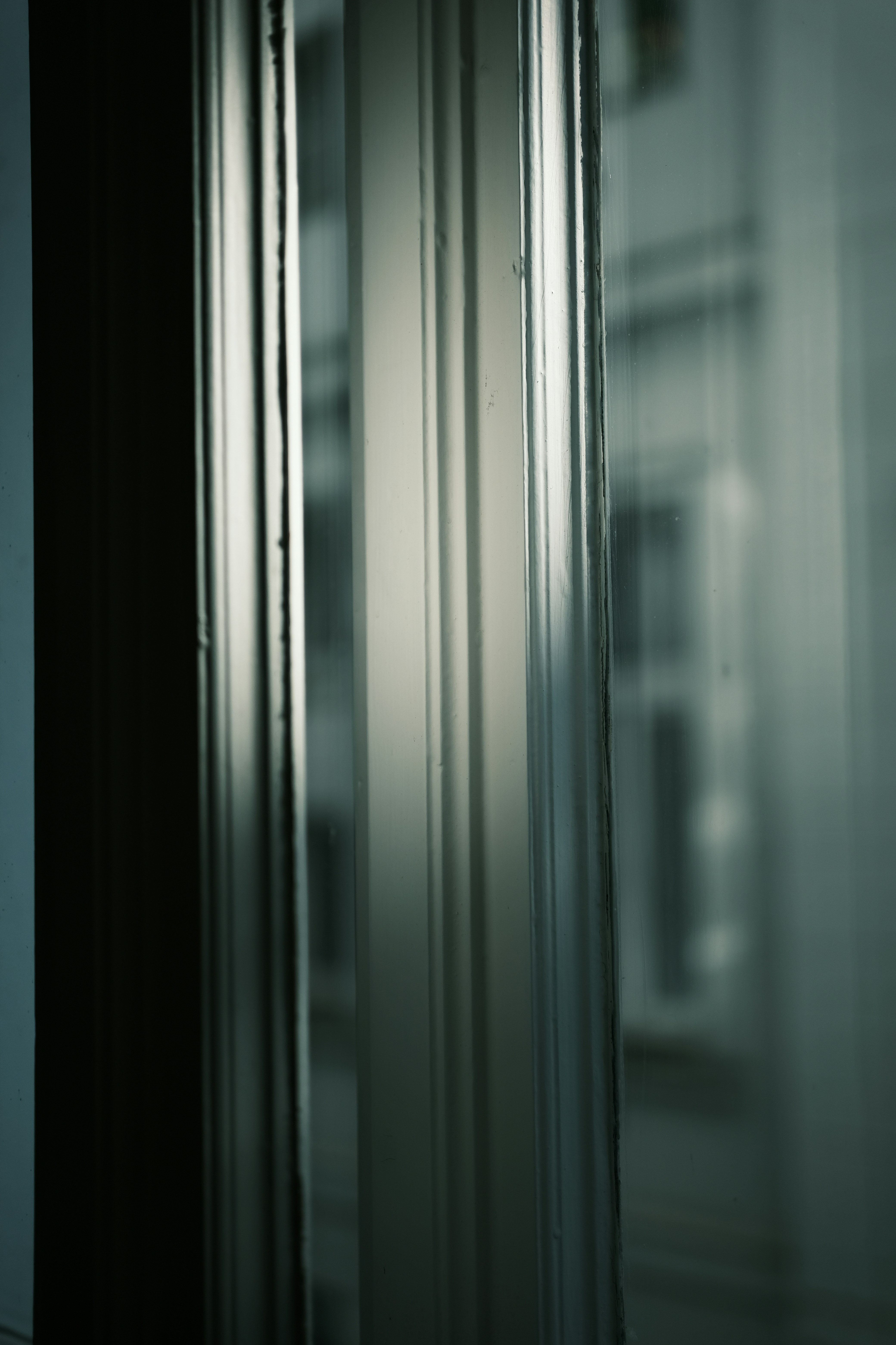 Window | Abstract metallic columns with blurred background