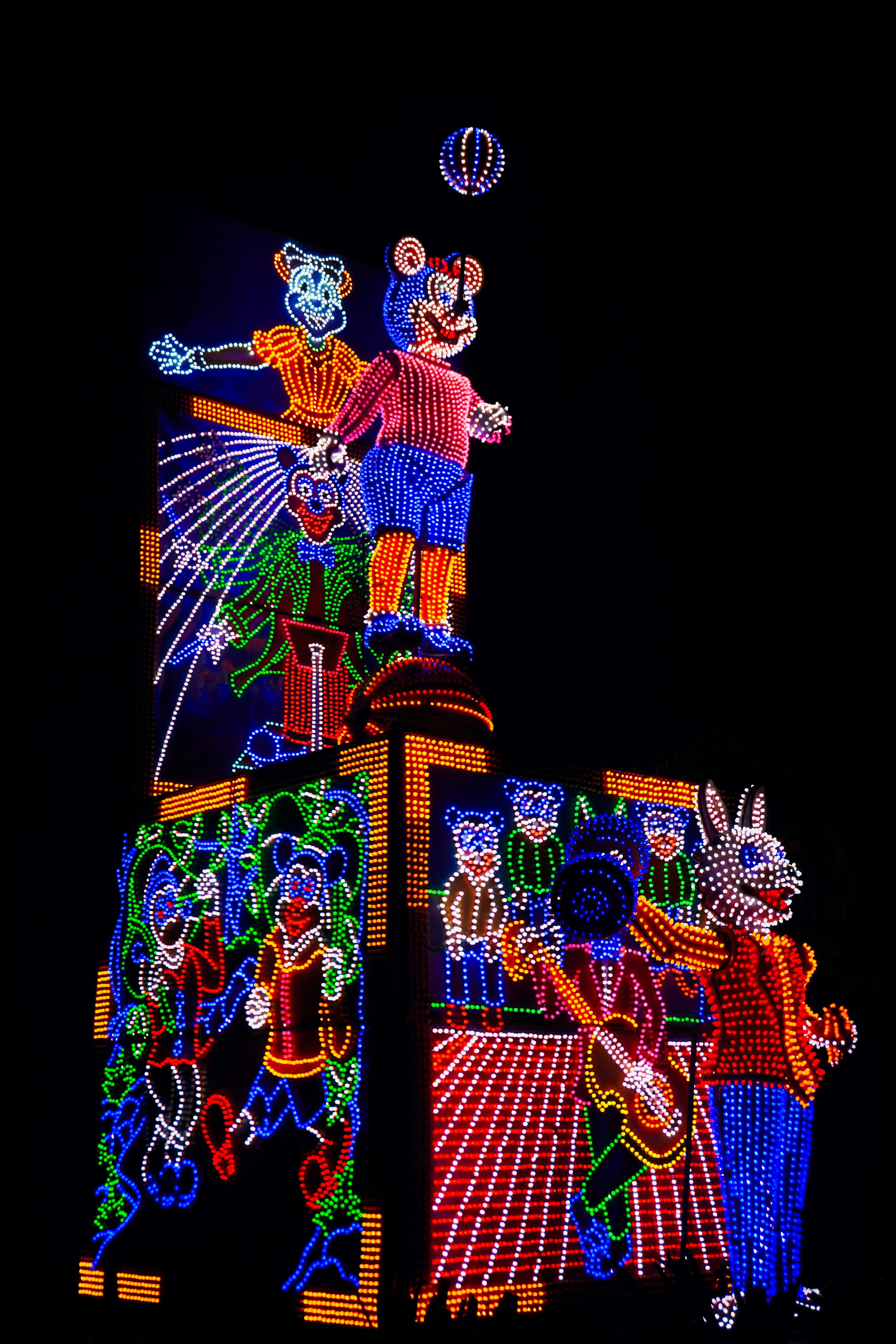 Animated light display of cartoon characters at night photo – Free ...