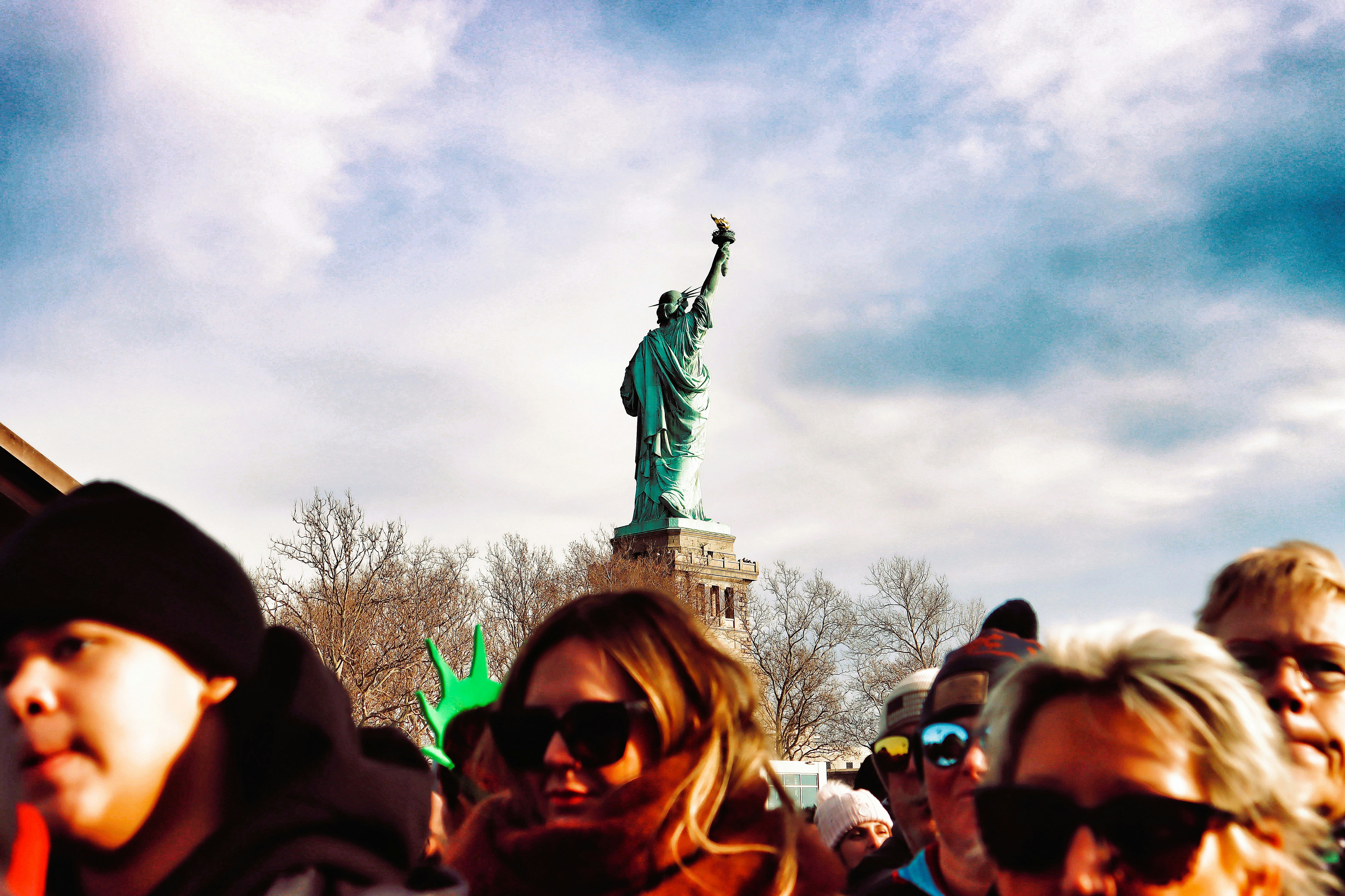 Voices of the Crowd Beneath Liberty's Gaze