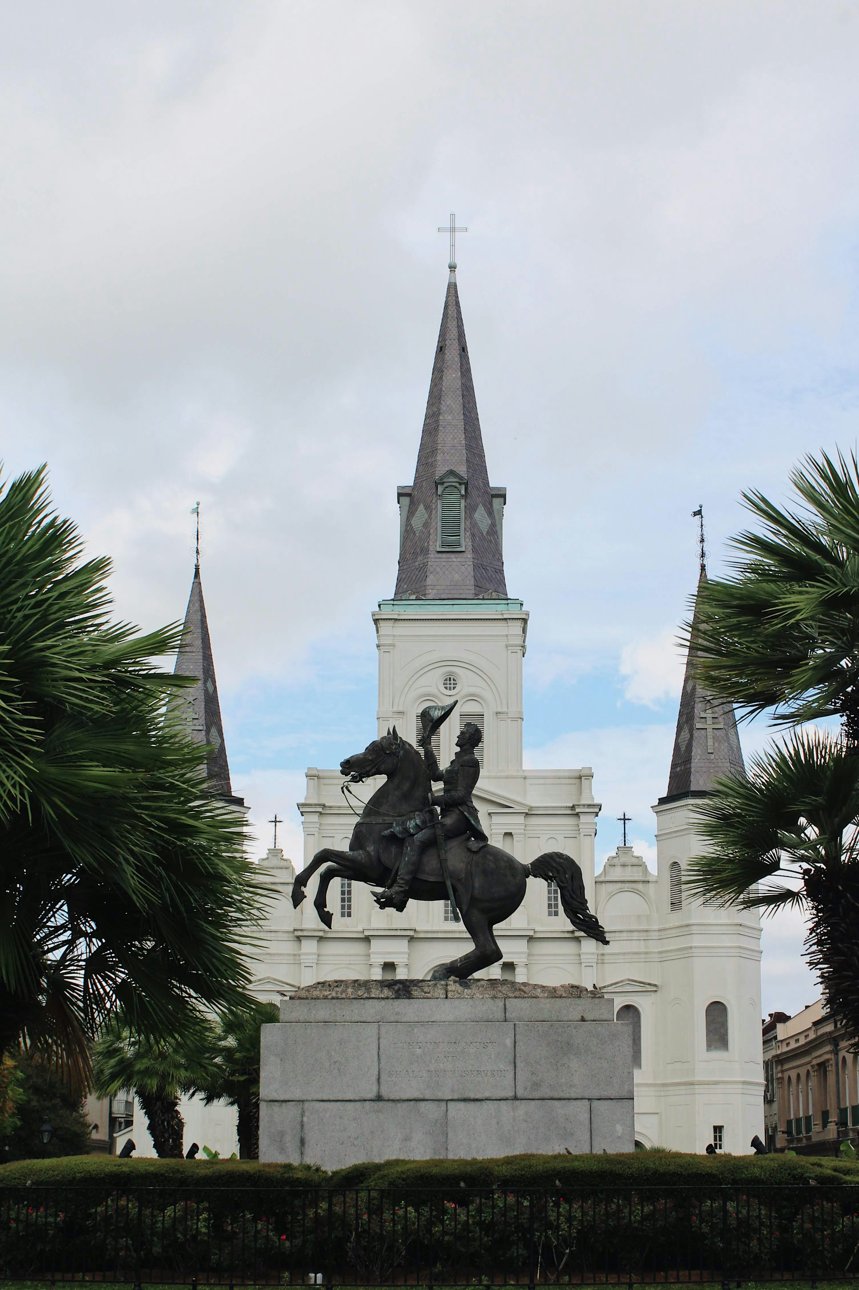 Equestrian Monument Framed by White Gothic Spires