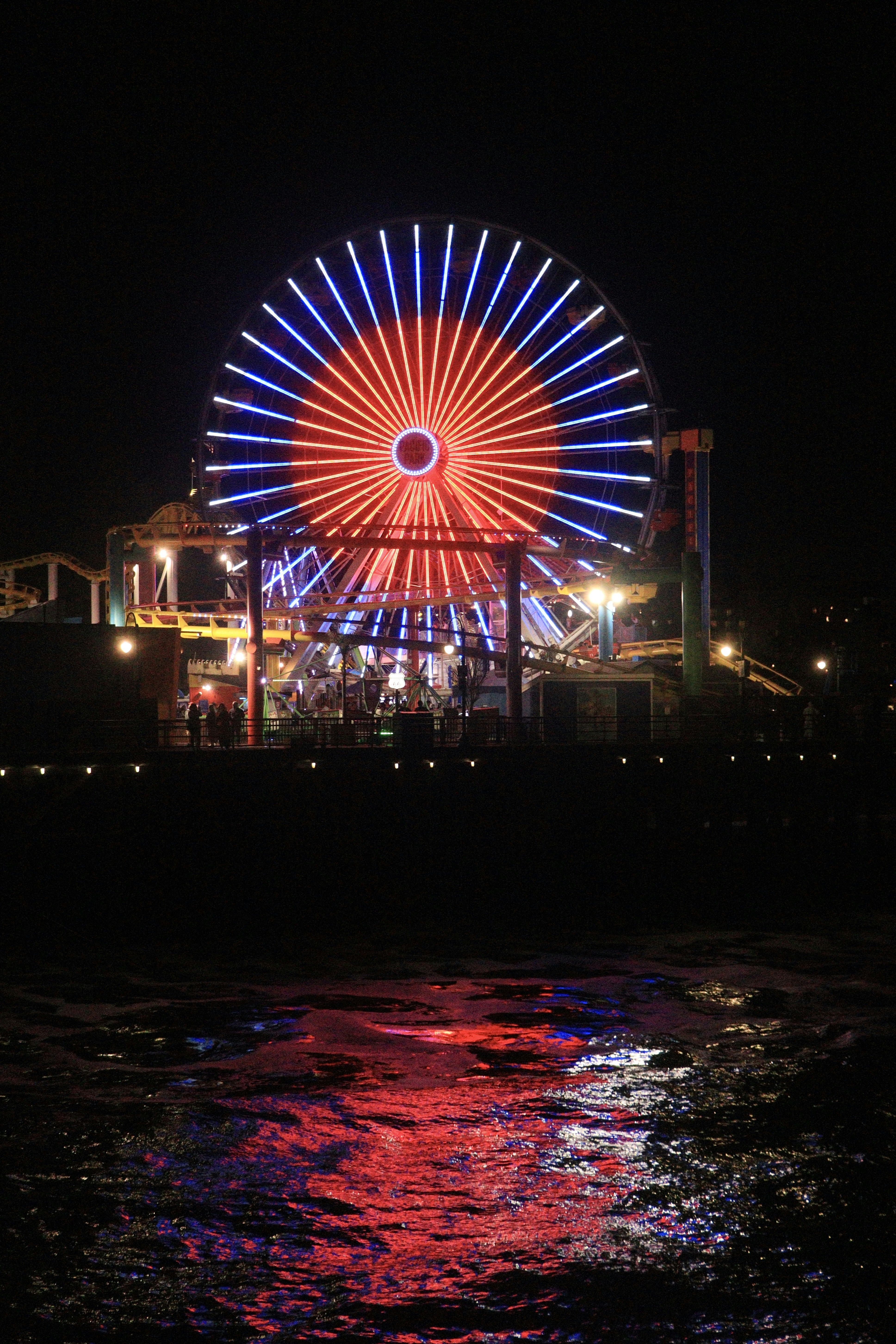 Neon Whirls: A Night at the Pier