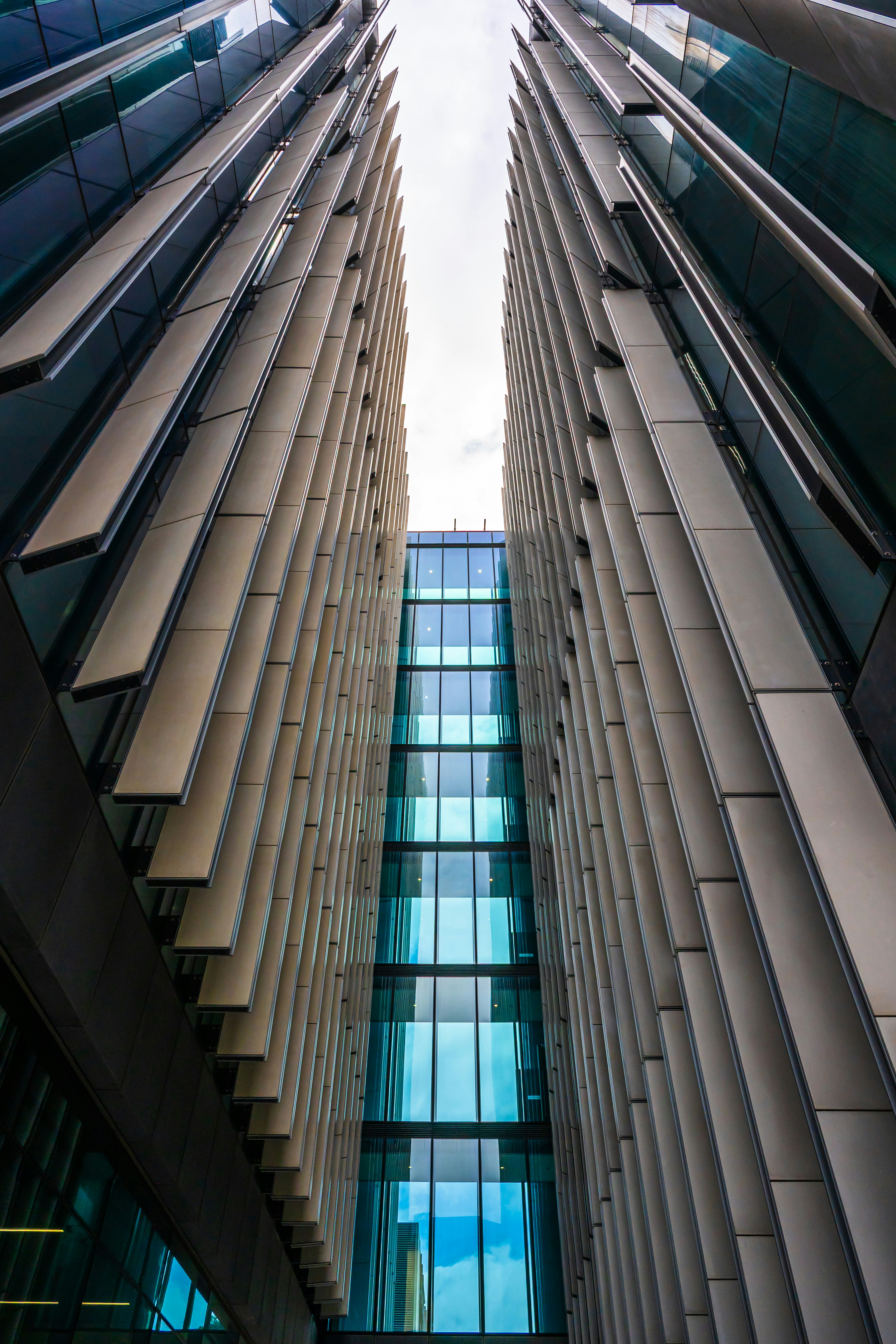 Modern glass buildings viewed from below