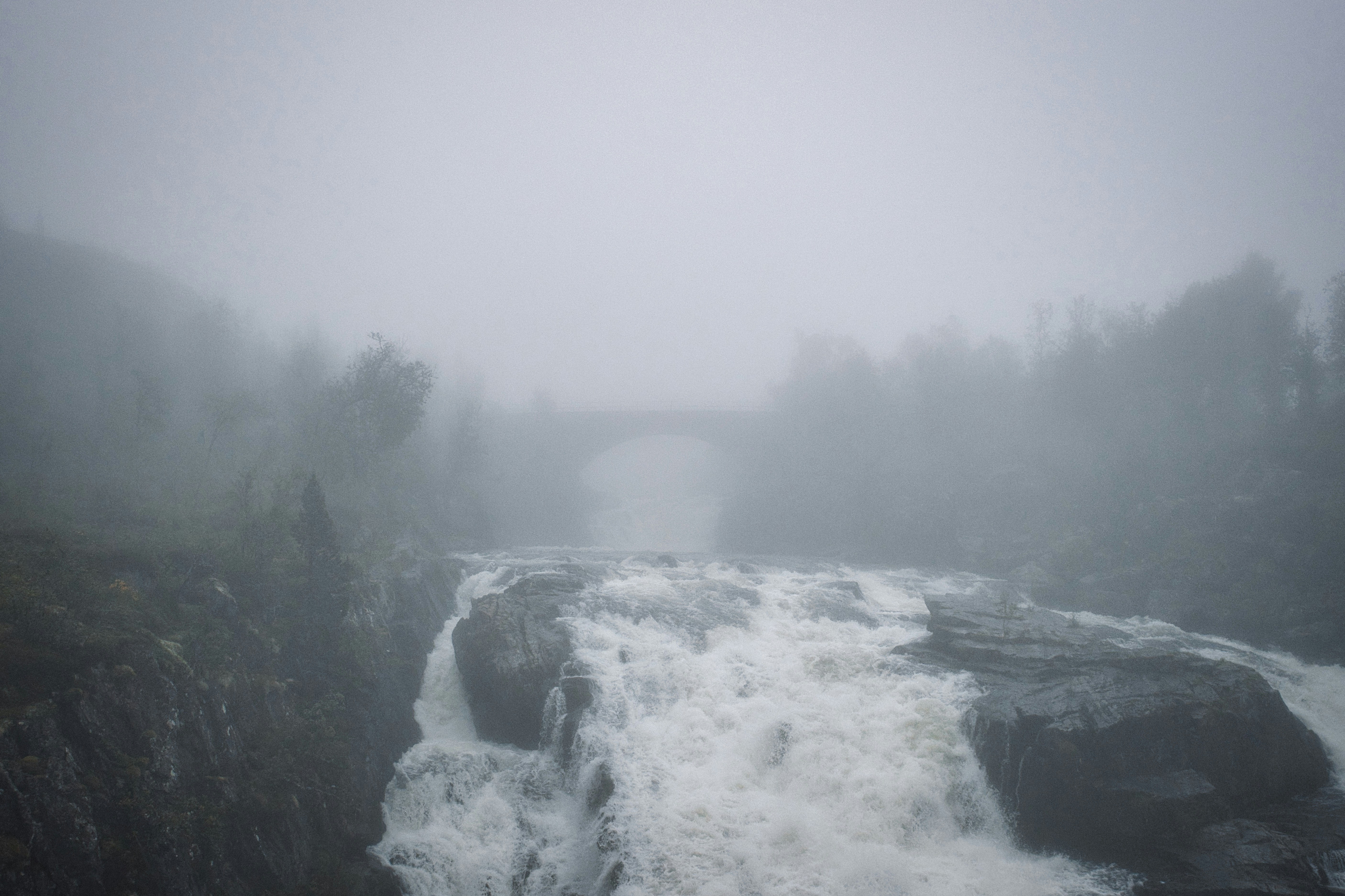 Veil of Mist Over the Cascading Waters