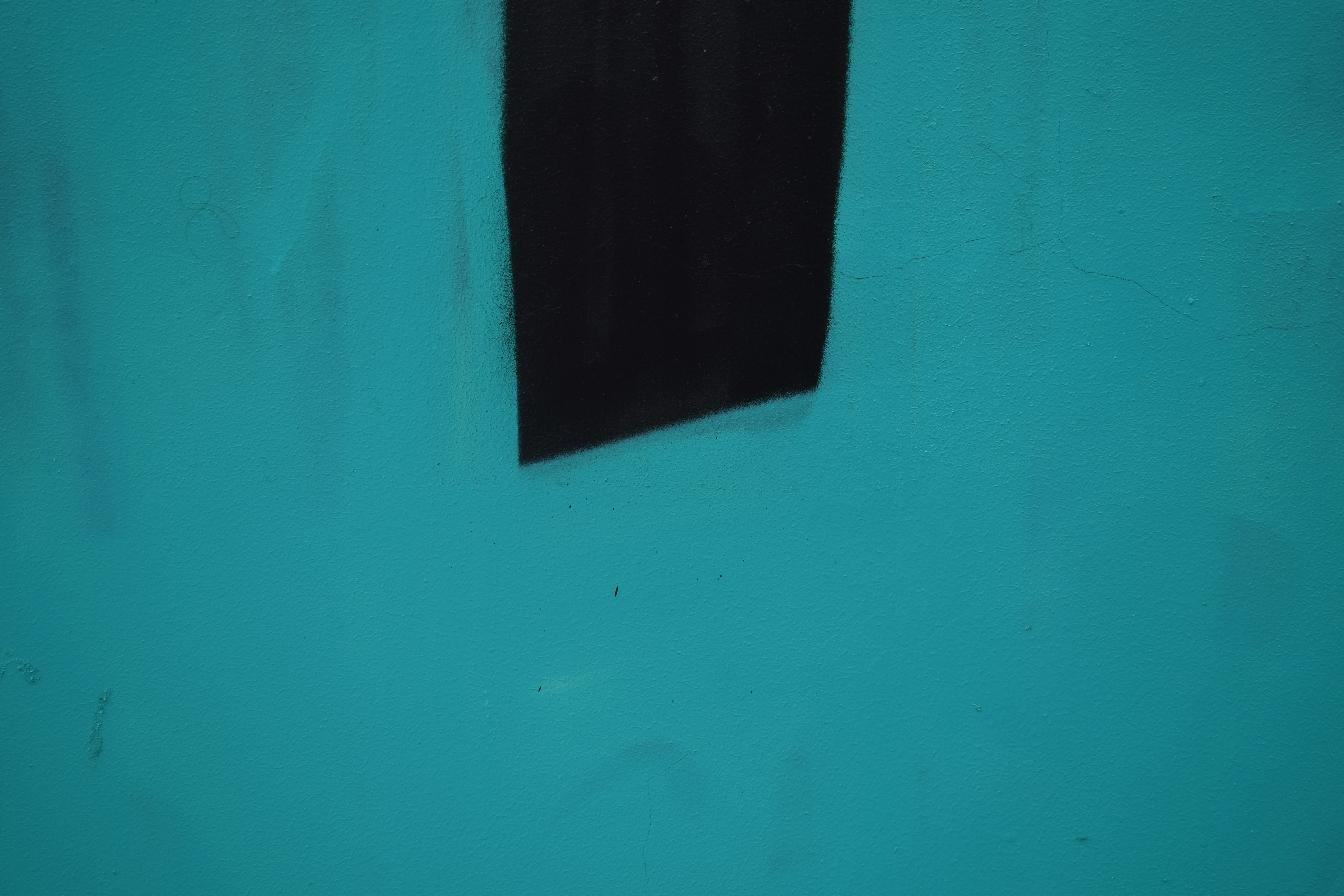 Black stripe on a turquoise background