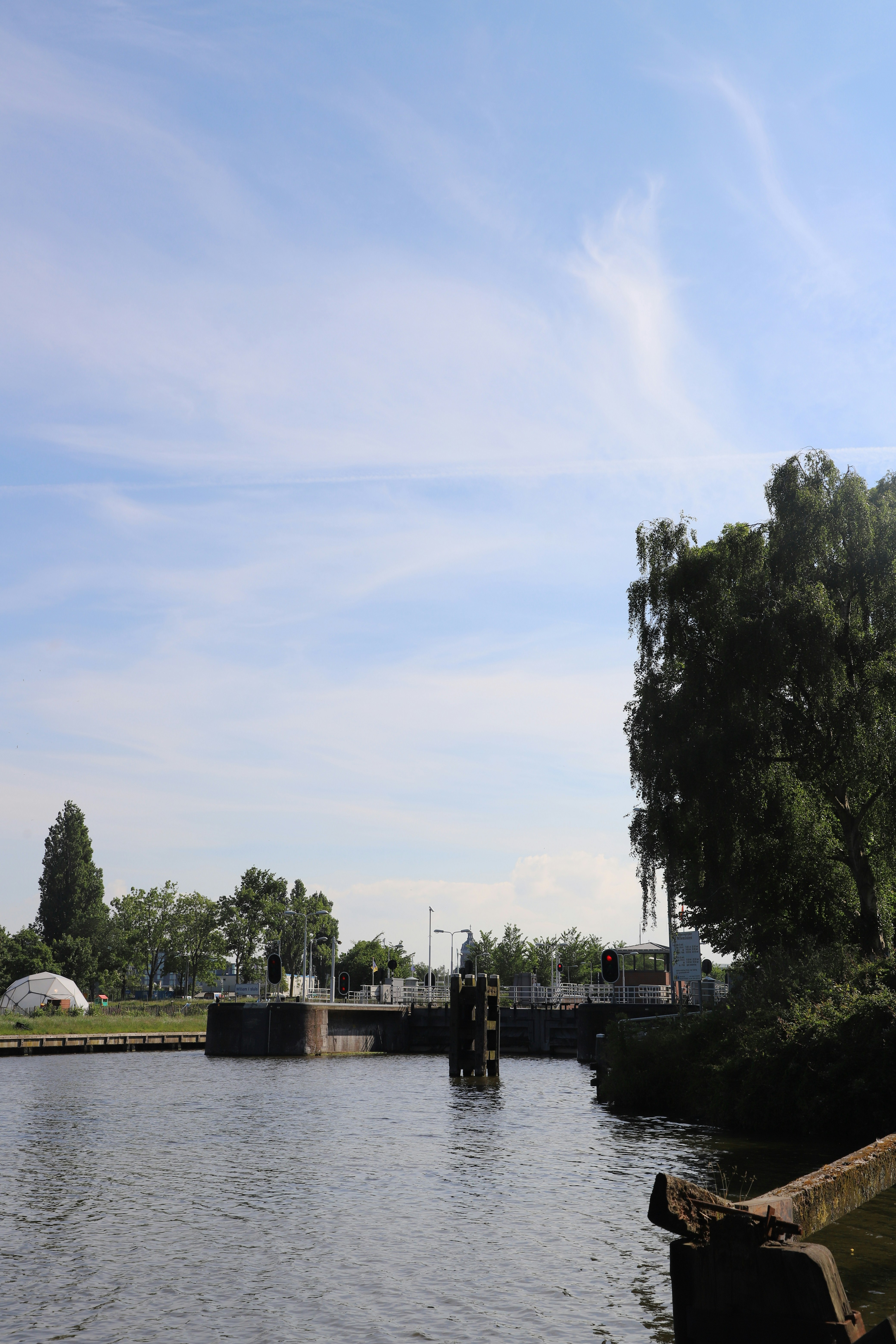 Serenity at the Water's Edge: A Tranquil Lock Scene