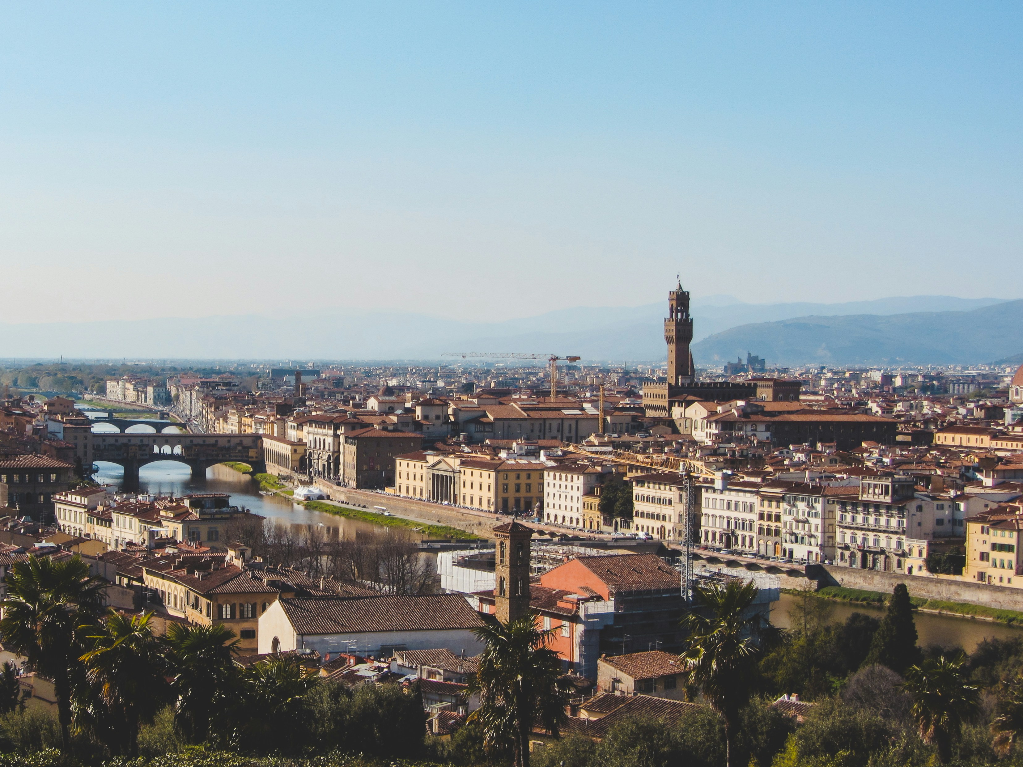 Florence skyline, viewed from the climb up to San Miniato al Monte | Panoramic view of florence cityscape with arno river