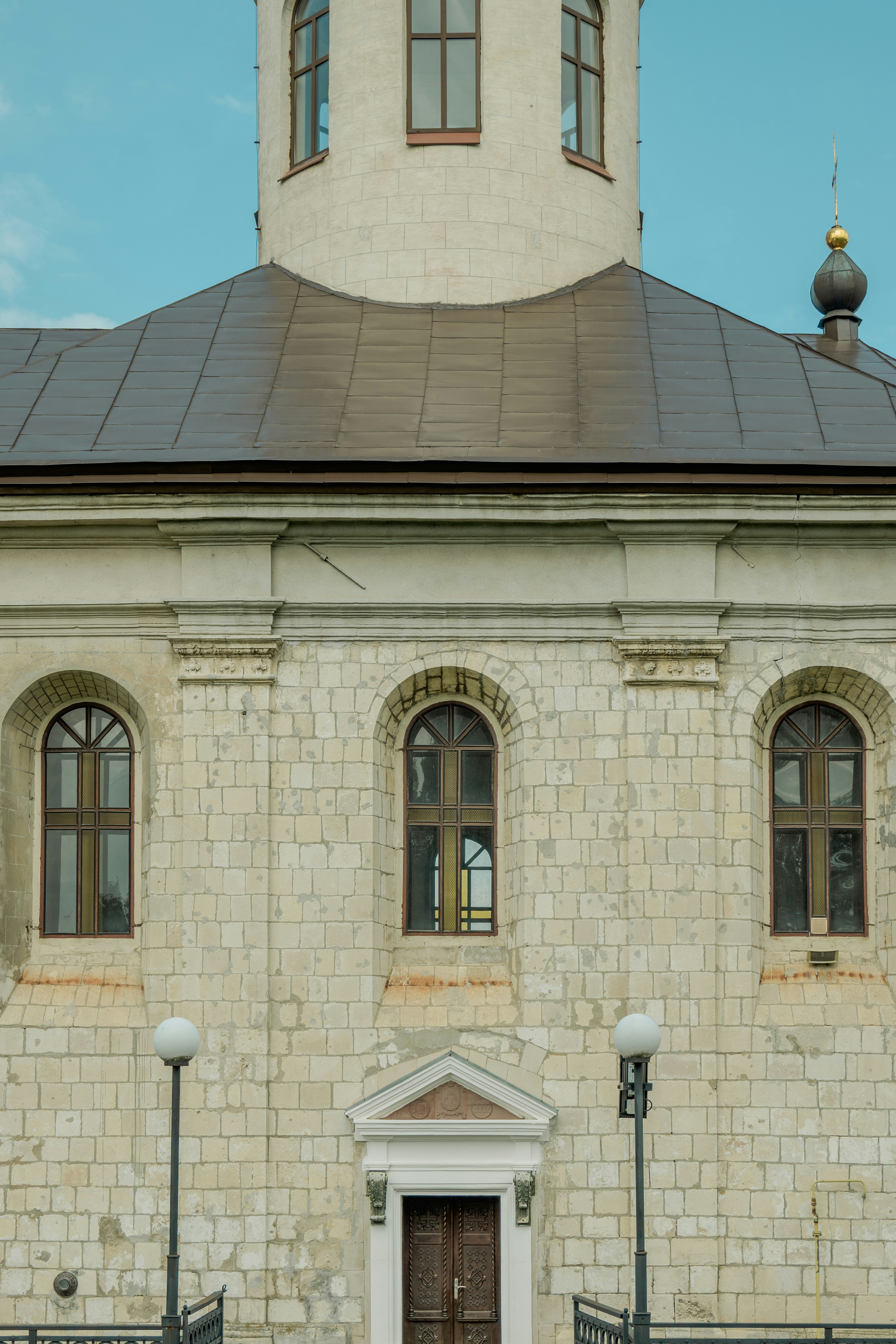 Stone building with arched windows and dome