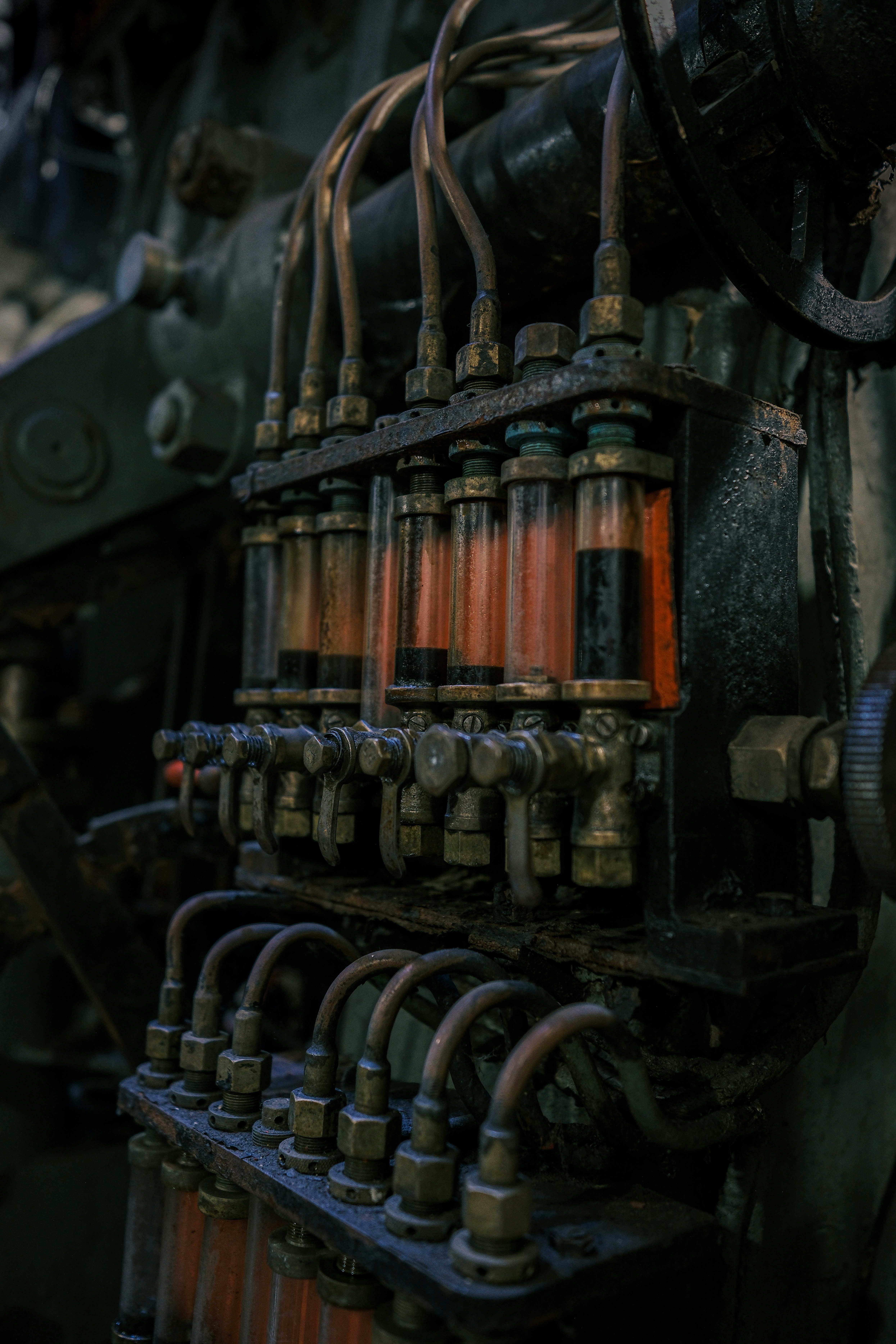 Close-up of an old engine's fuel injection system.